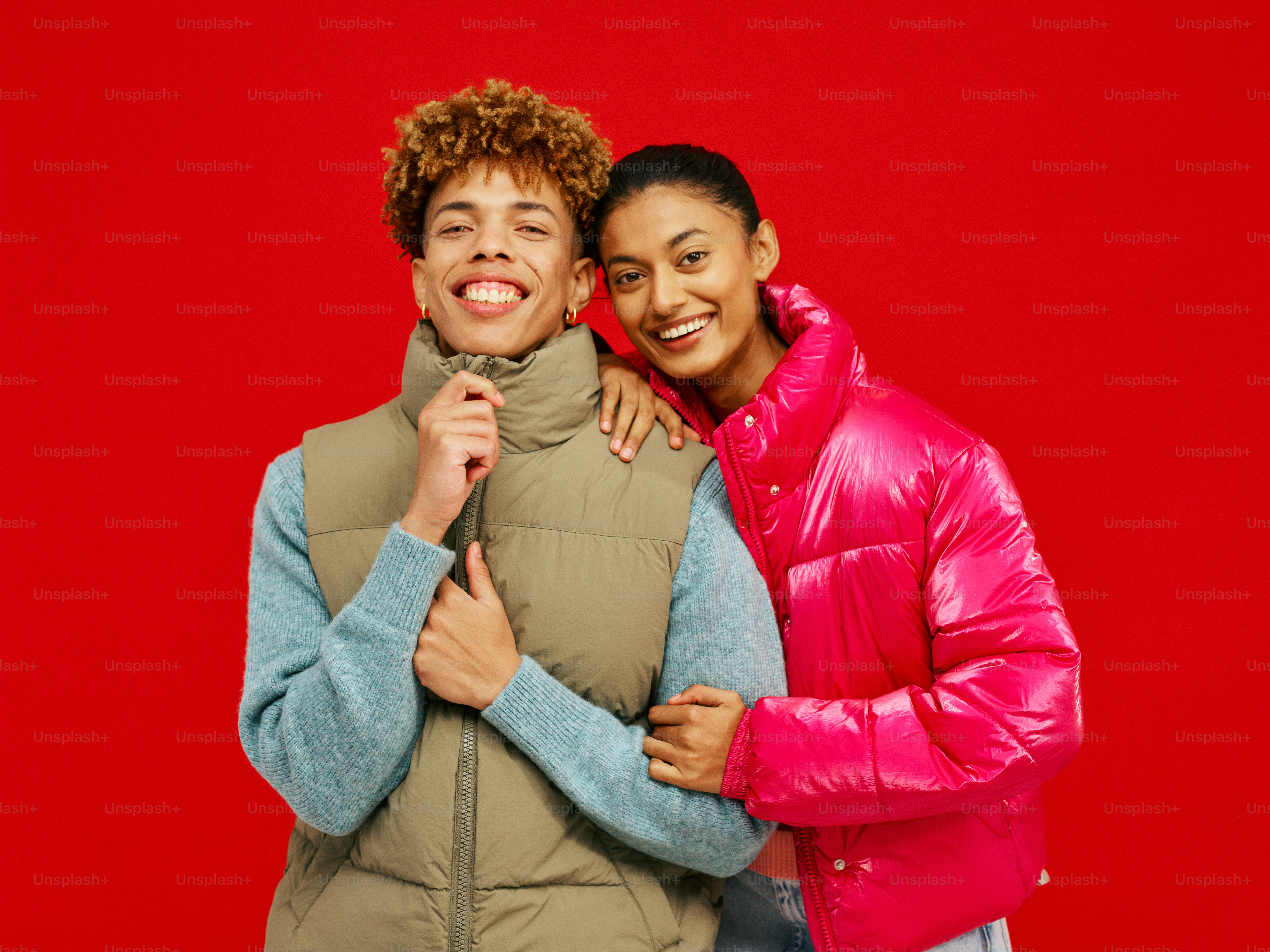 A couple of women standing next to each other photo – Fashion Image on ...