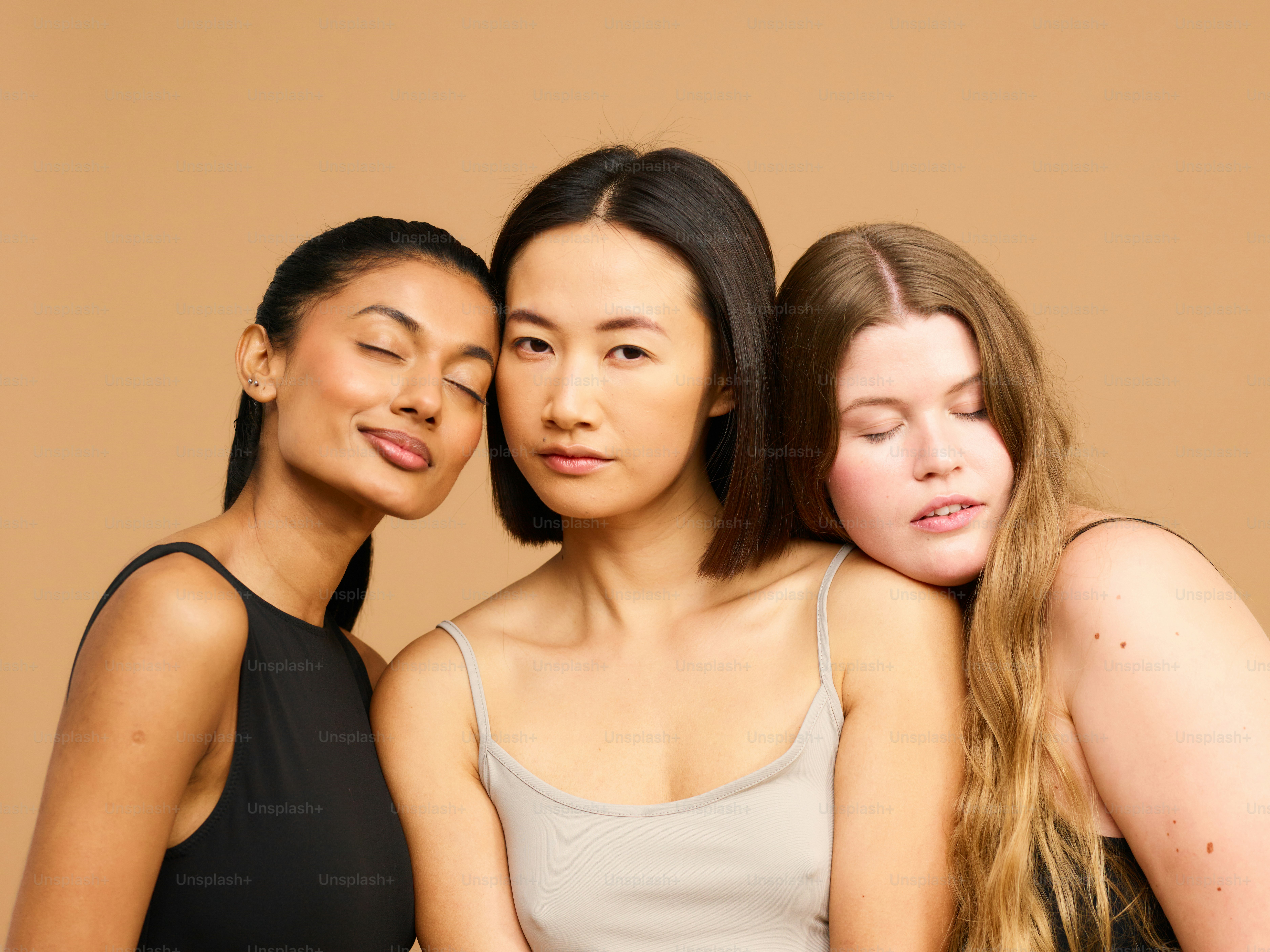 A group of three women standing next to each other photo – Cosmetics ...