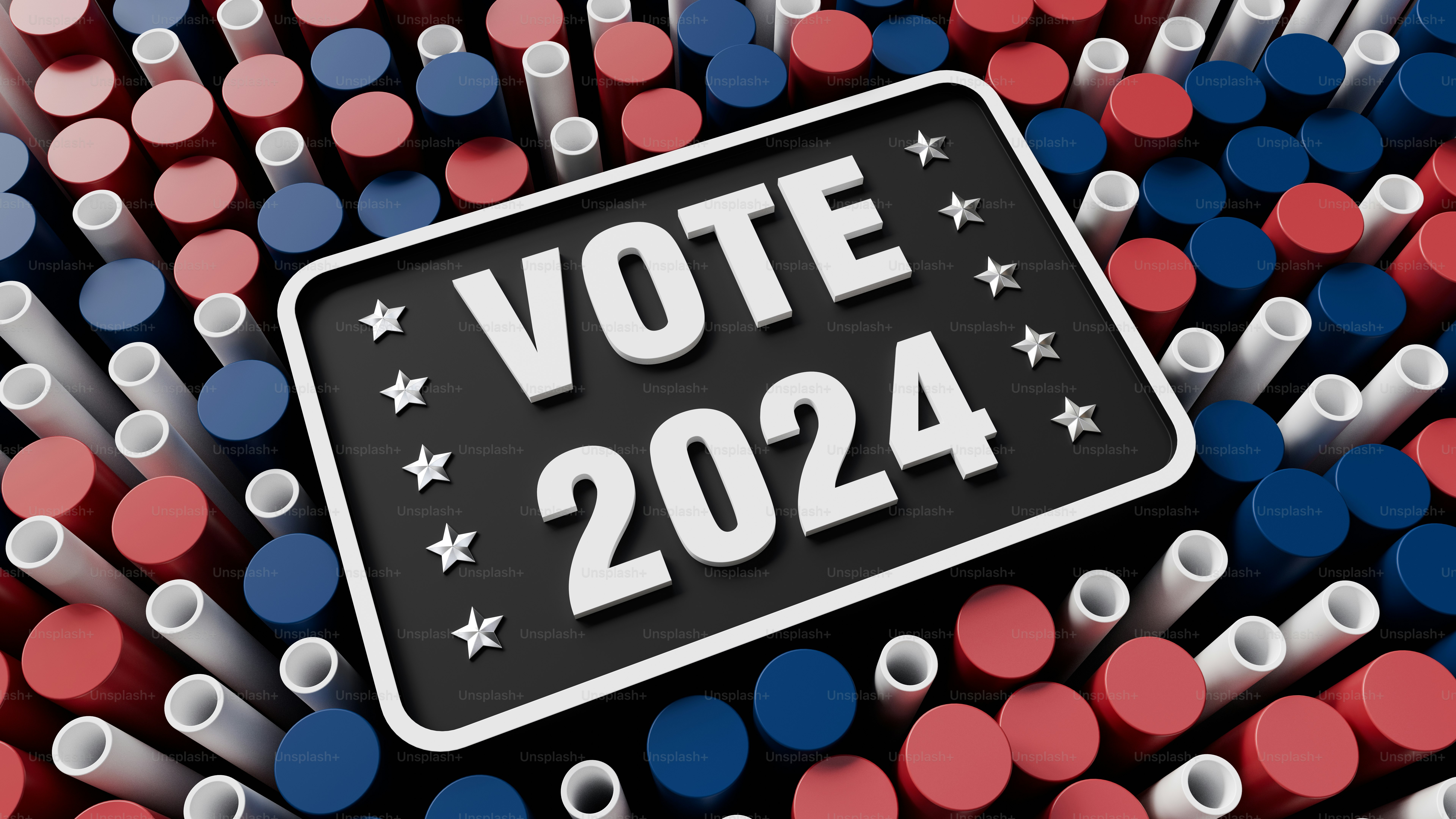 Une pancarte de vote entourée de rangées de crayons rouges, blancs et ...