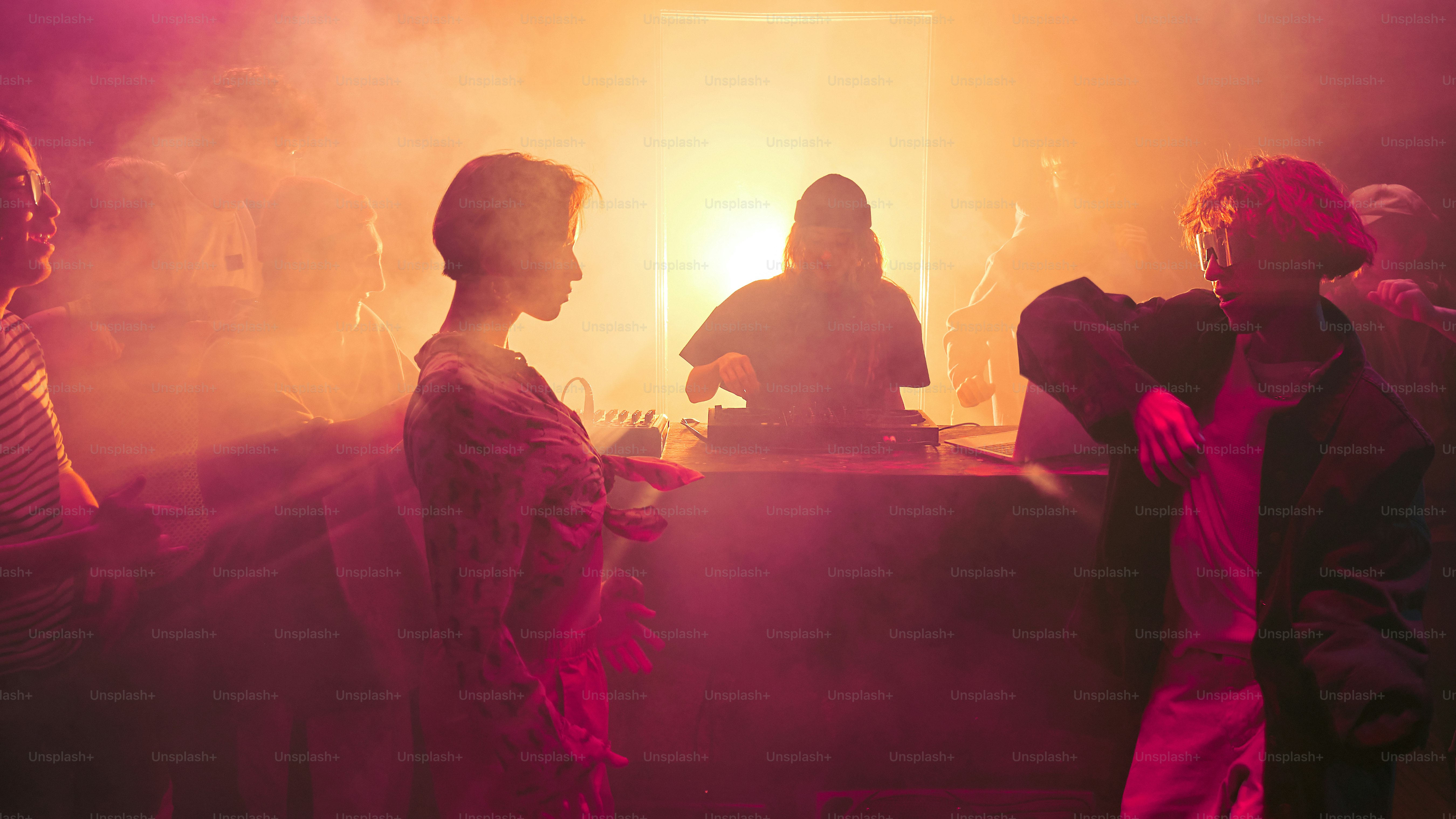 A group of people standing in front of a stage photo – Music Image on ...