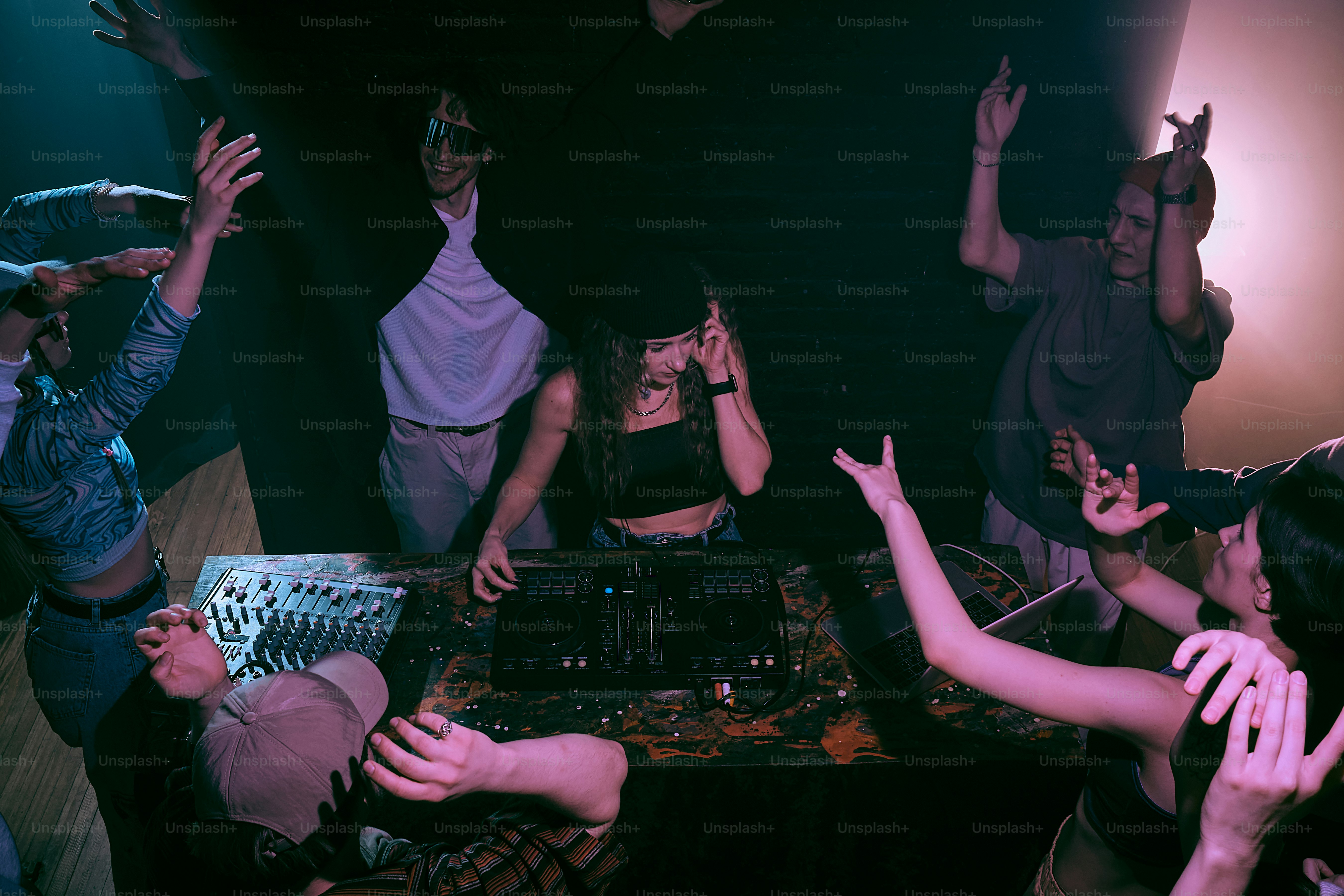 A group of people standing in front of a stage photo – Rave Image on ...