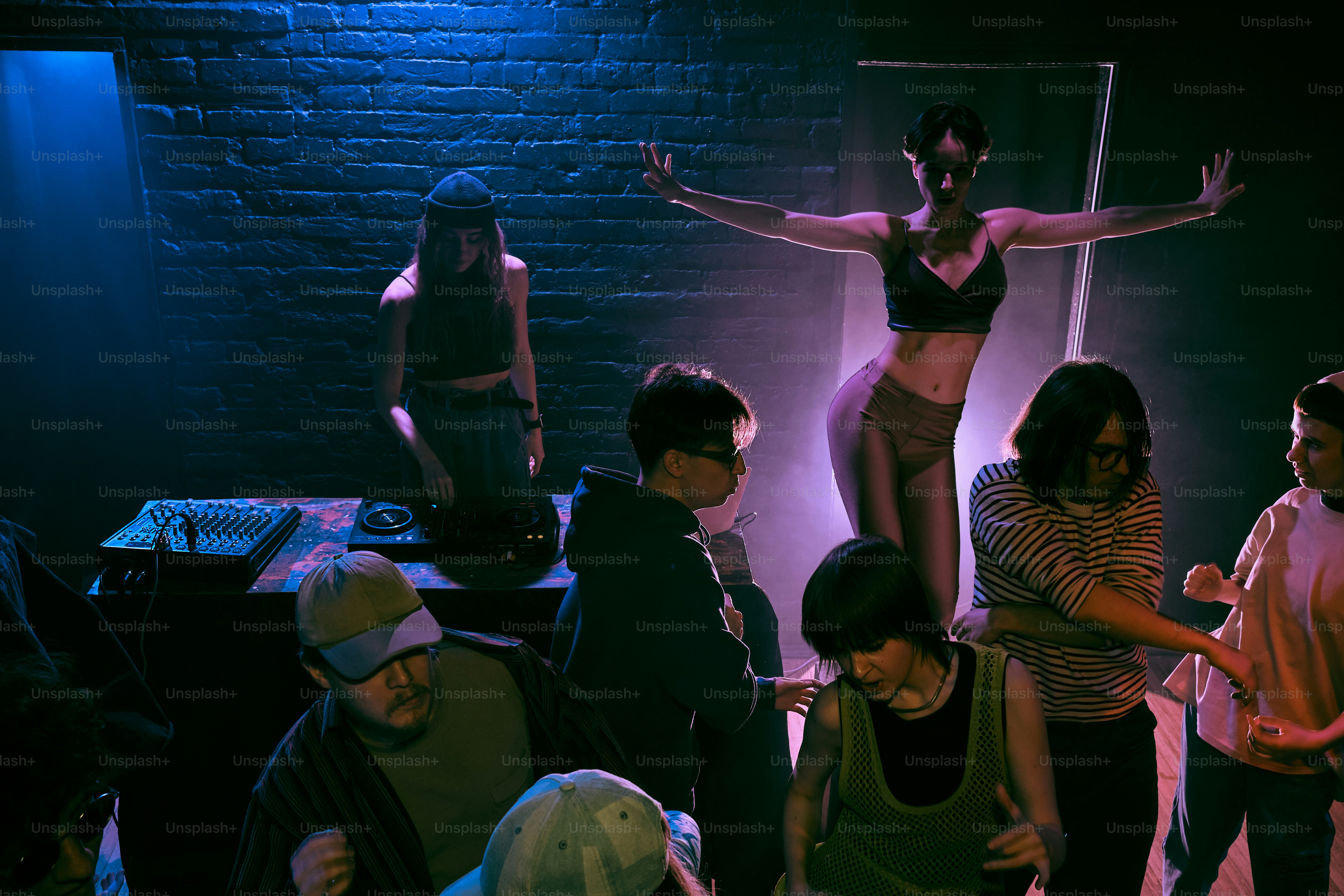 A group of people standing in front of a stage photo – Rave Image on ...