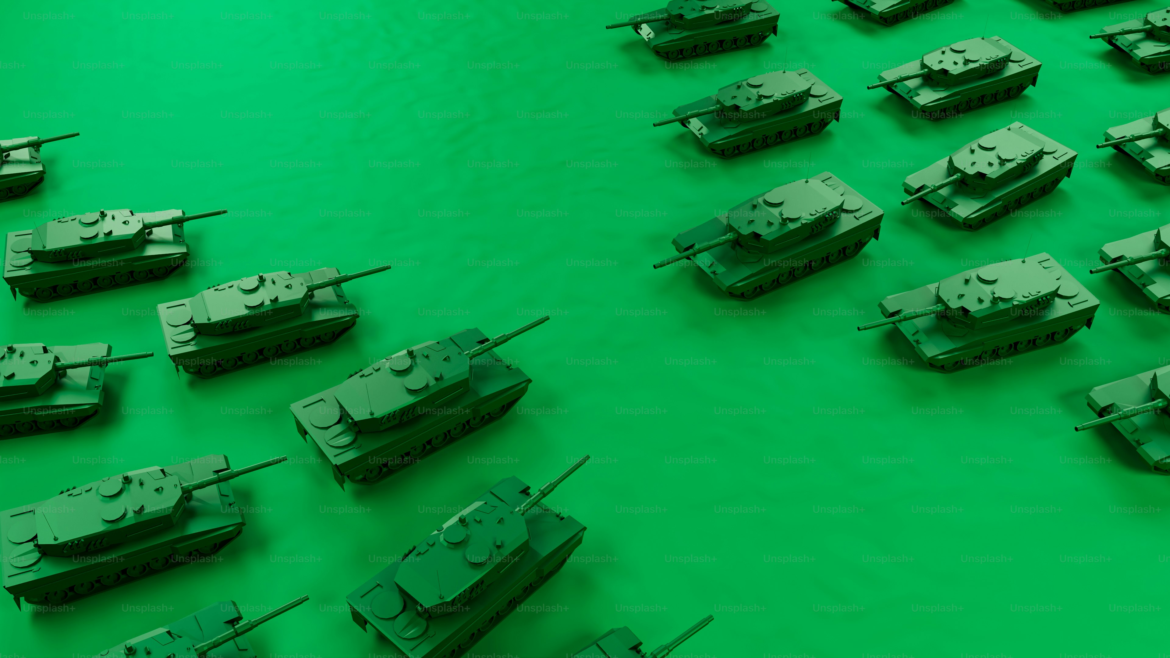 A bunch of tanks that are on a green surface photo – Tanks Image on ...