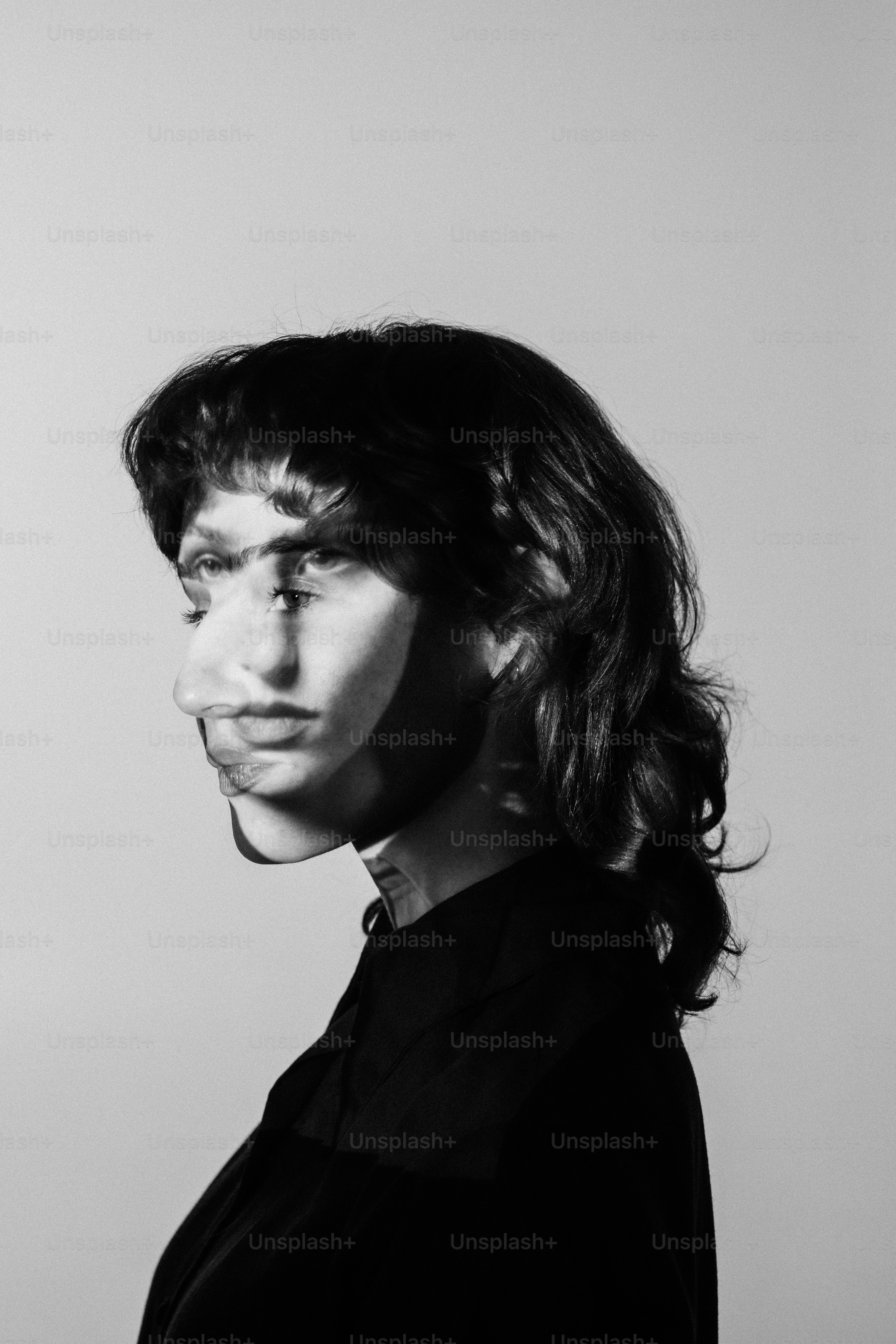 A woman standing in front of a broken window photo – Portrait Image on ...