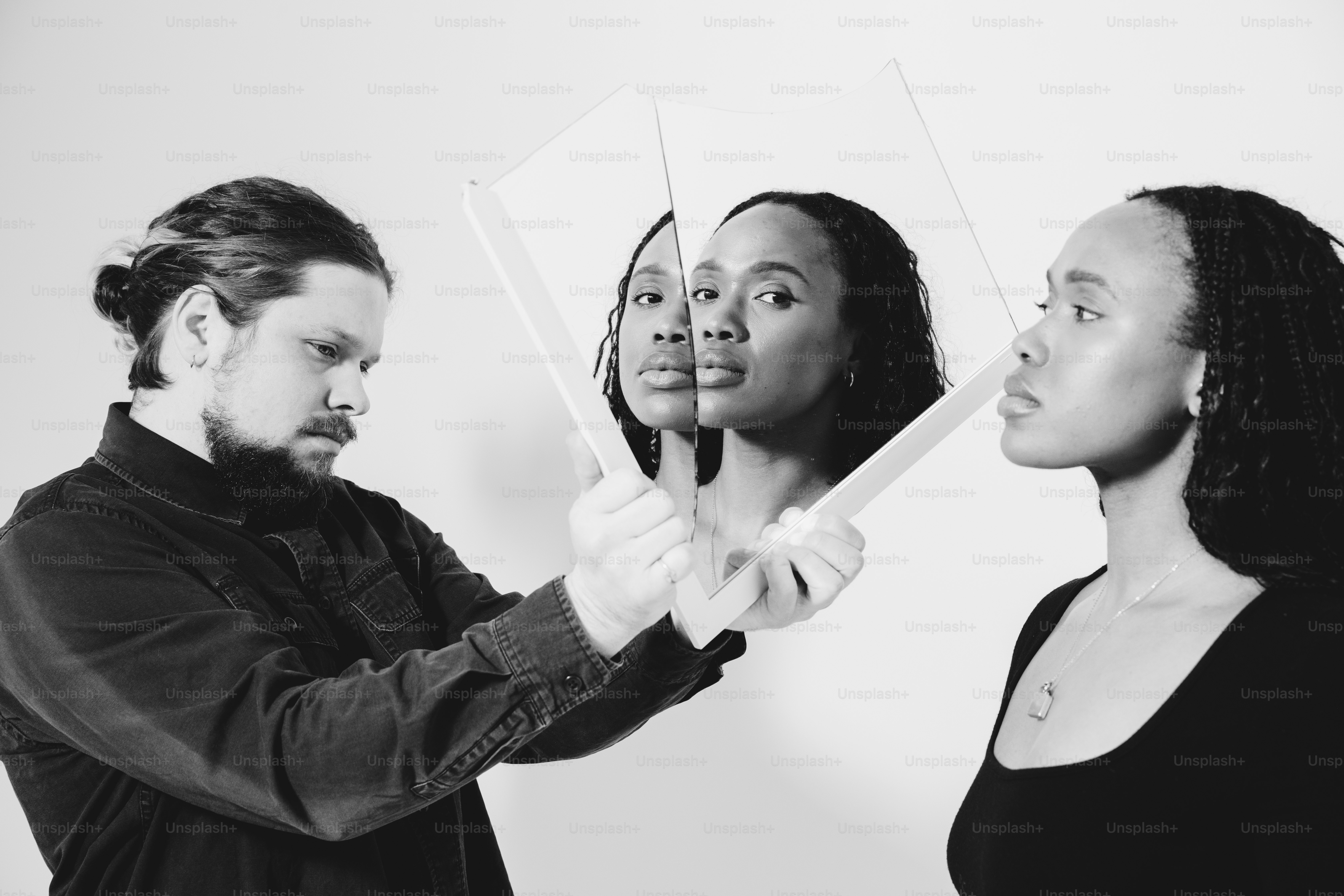 A man holding a pair of scissors to a woman's face photo – Self ...