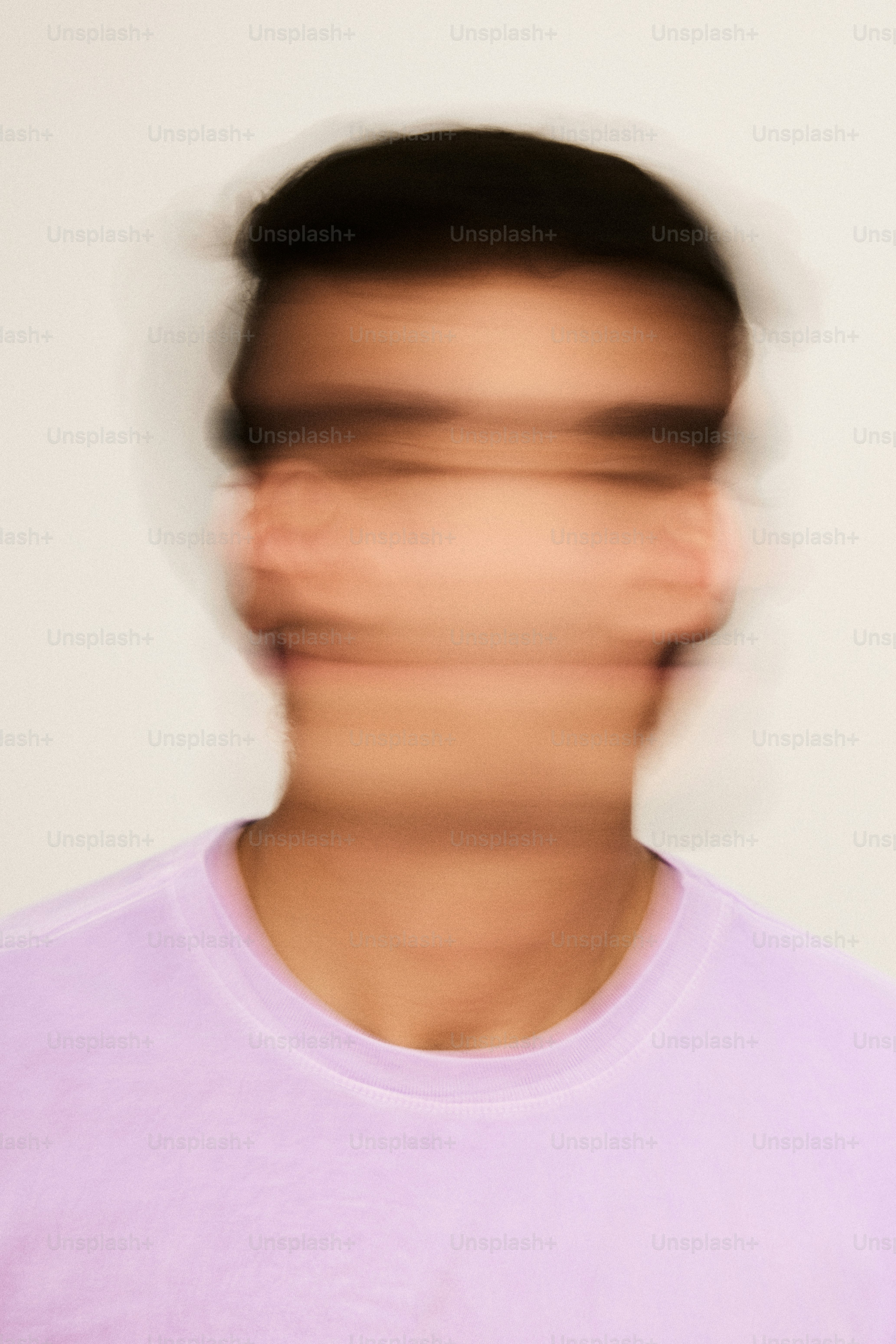 A blurry photo of a man's face photo – Long exposure Image on Unsplash