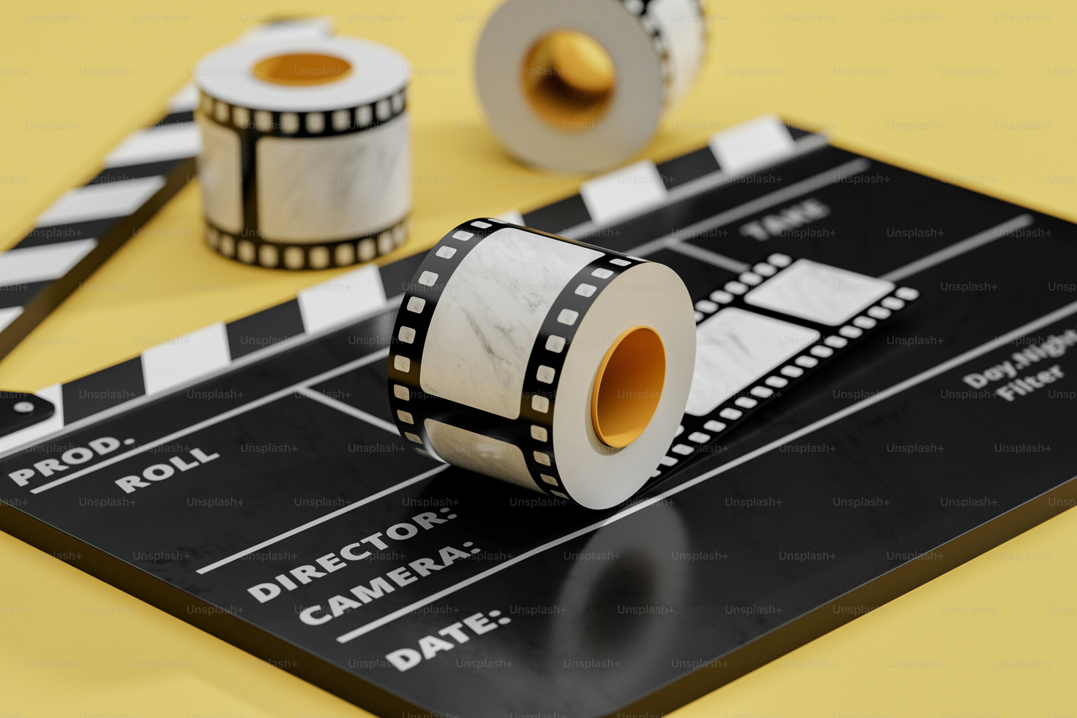 A roll of film sitting on top of a movie board photo – Film frame Image ...