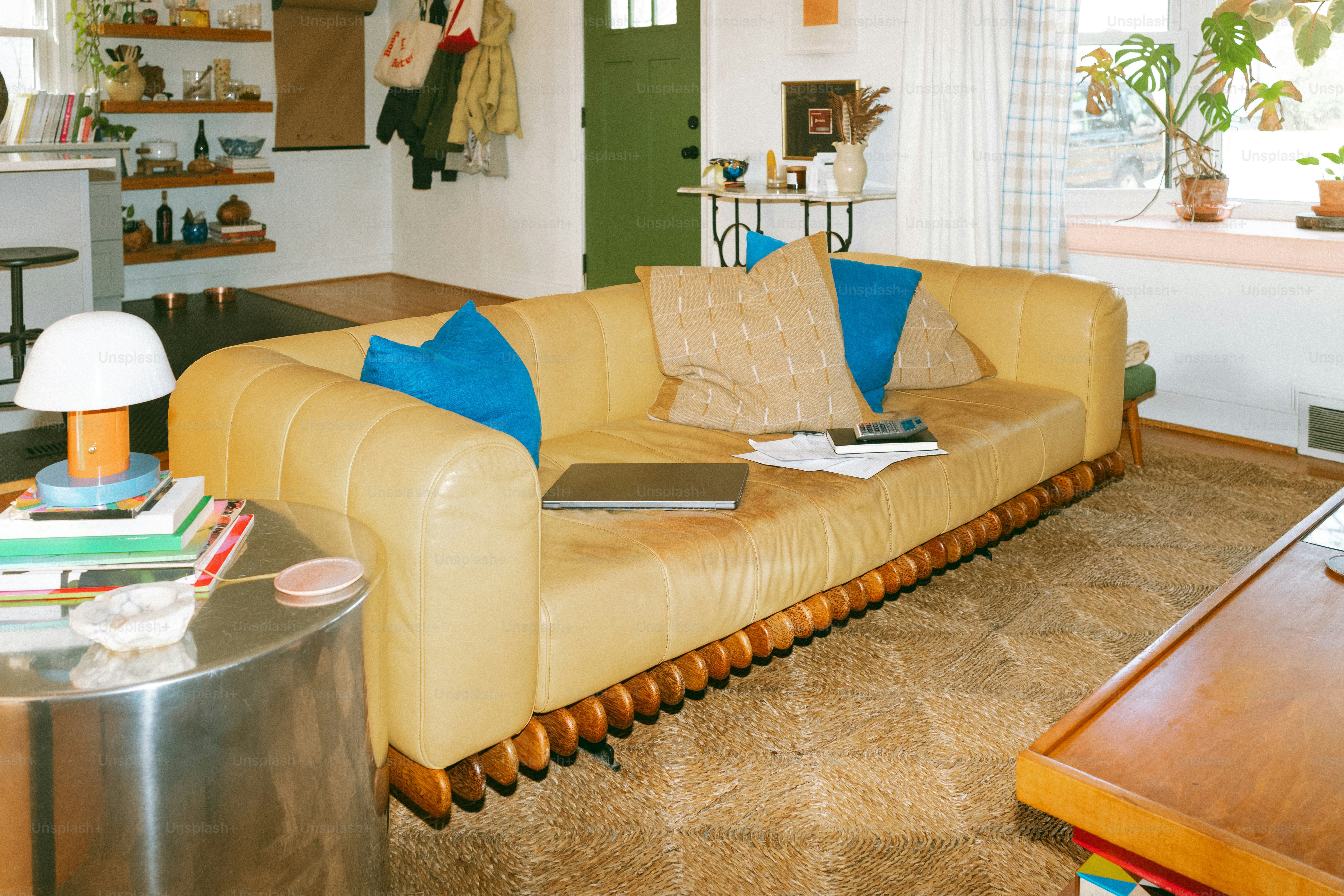 A room with a table, chairs, and a laptop photo – Remote working Image ...