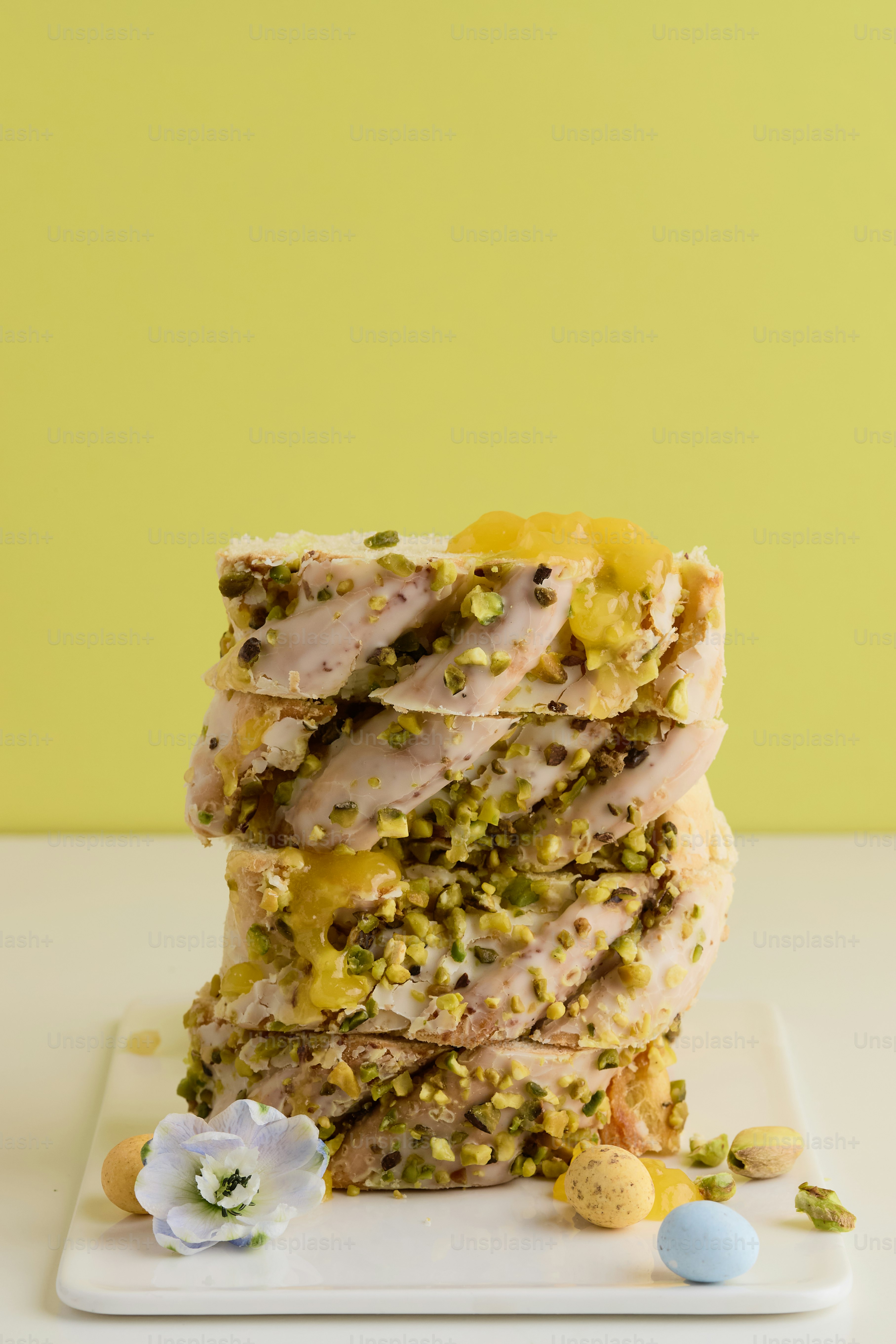 A stack of food sitting on top of a white plate photo – Stacked bread ...