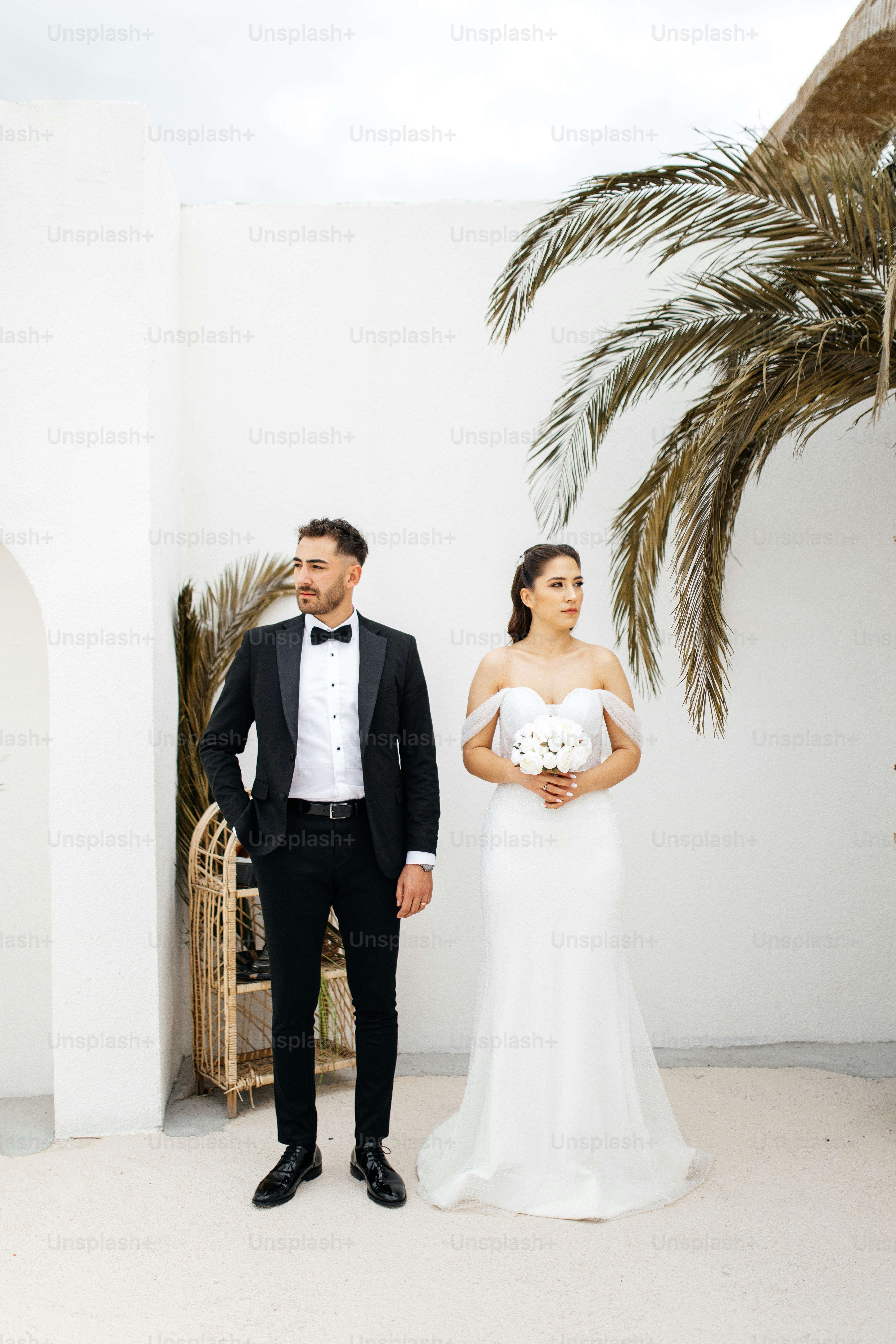 A bride and groom standing next to each other photo – Wedding Image on ...
