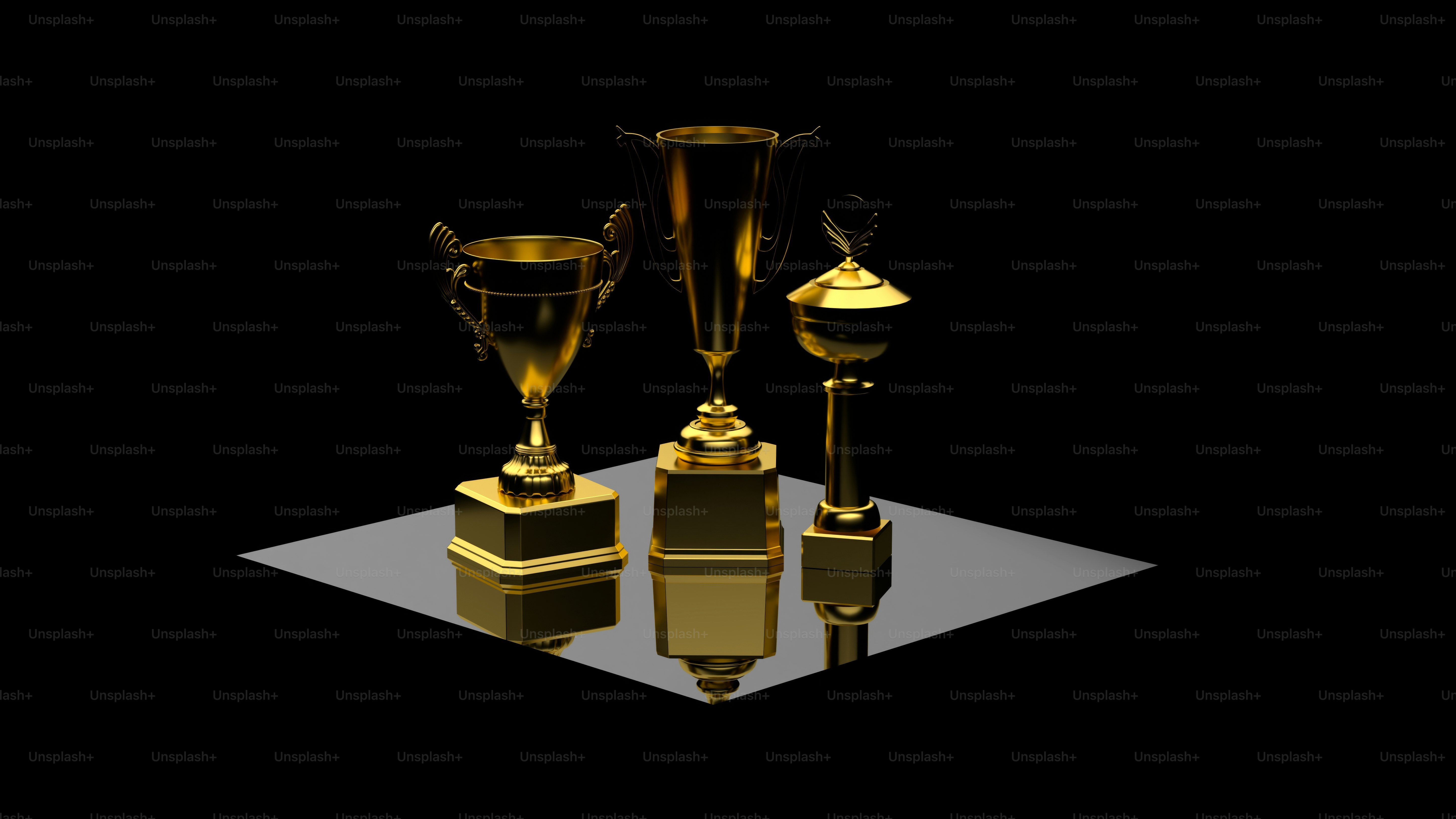 A group of trophies sitting on top of a table photo – Winning trophy ...