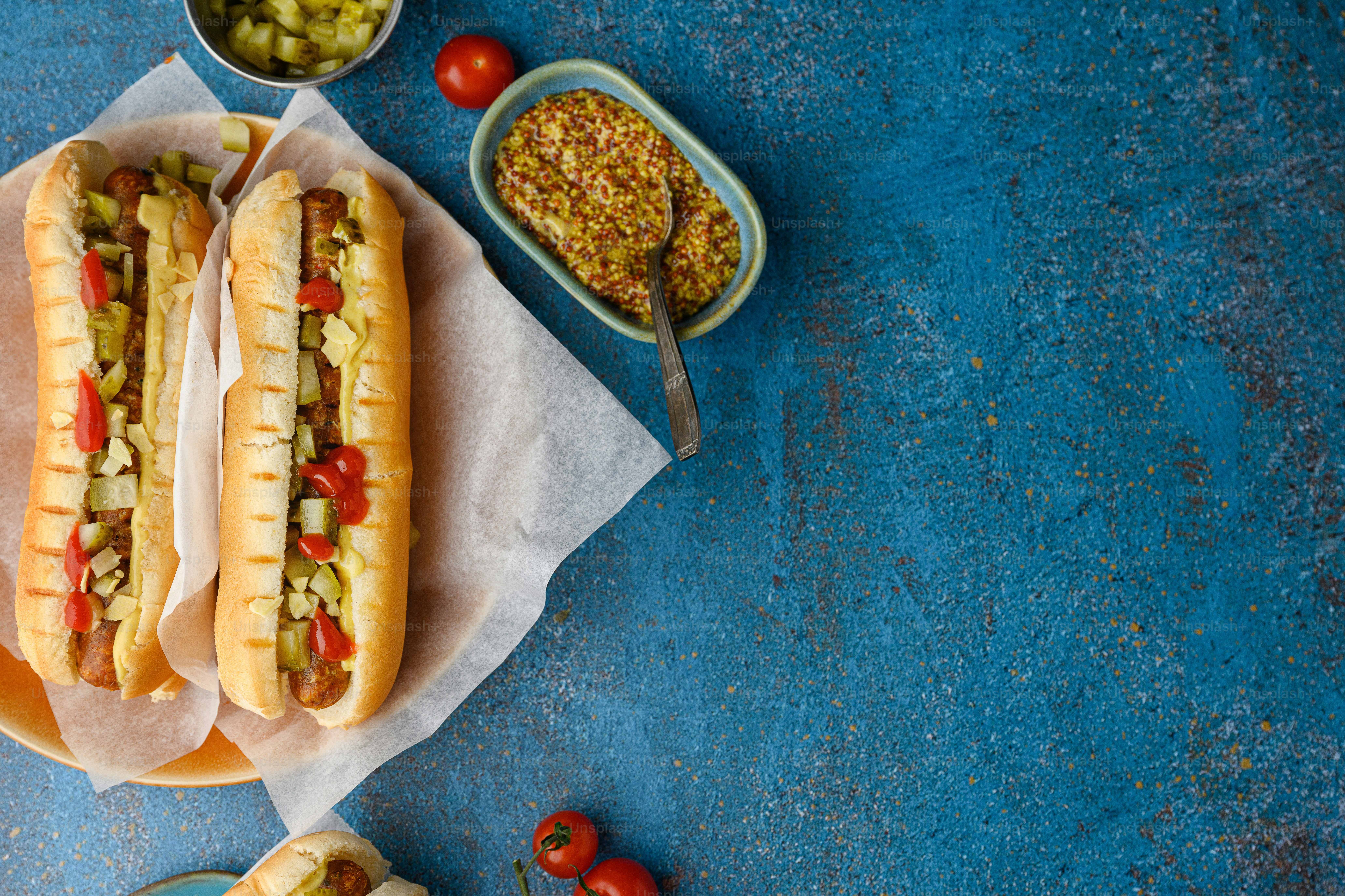 Two hot dogs on buns with relish and tomatoes photo – Vegan proteins ...