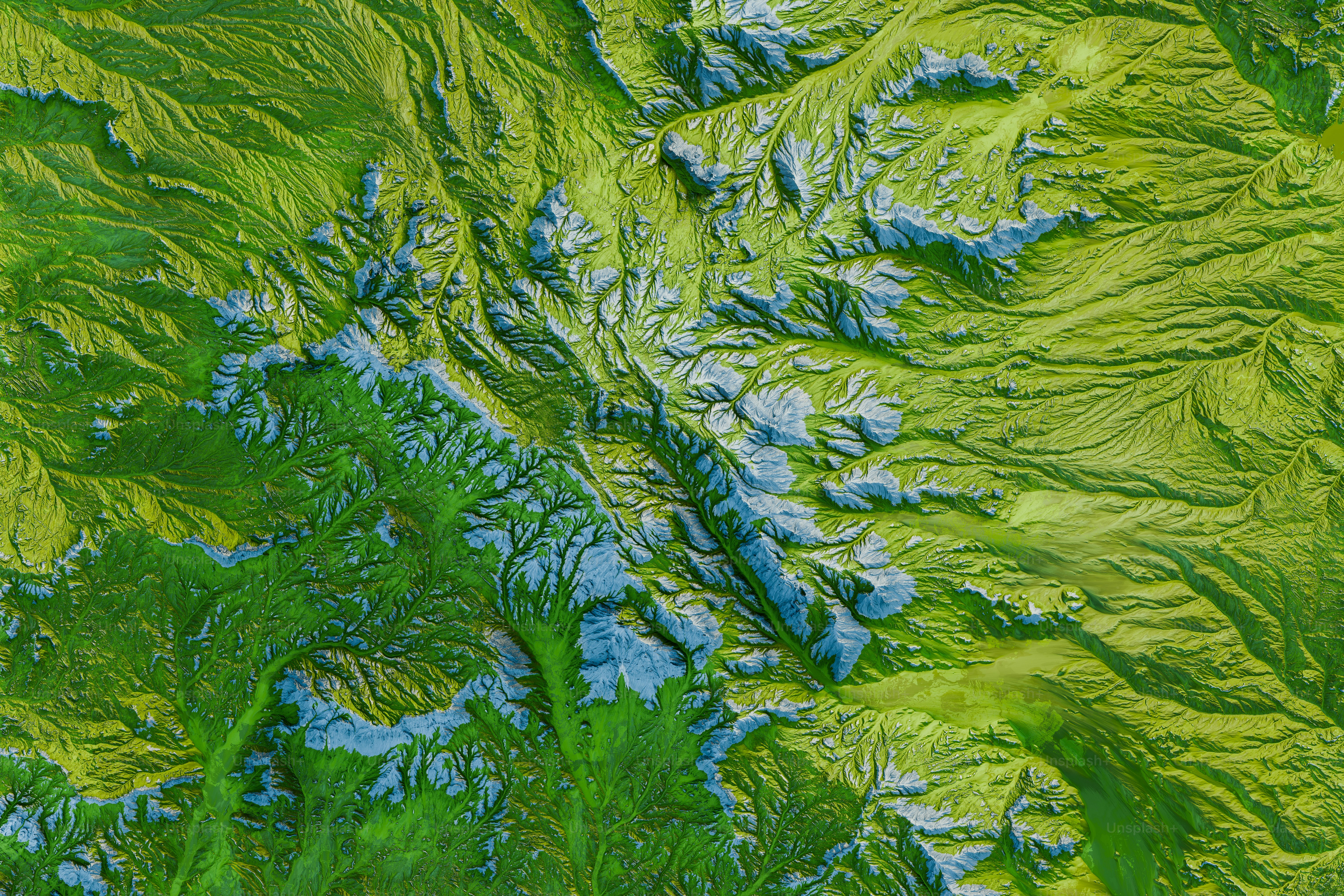 A satellite image of a green mountain range photo – Sattelite view ...