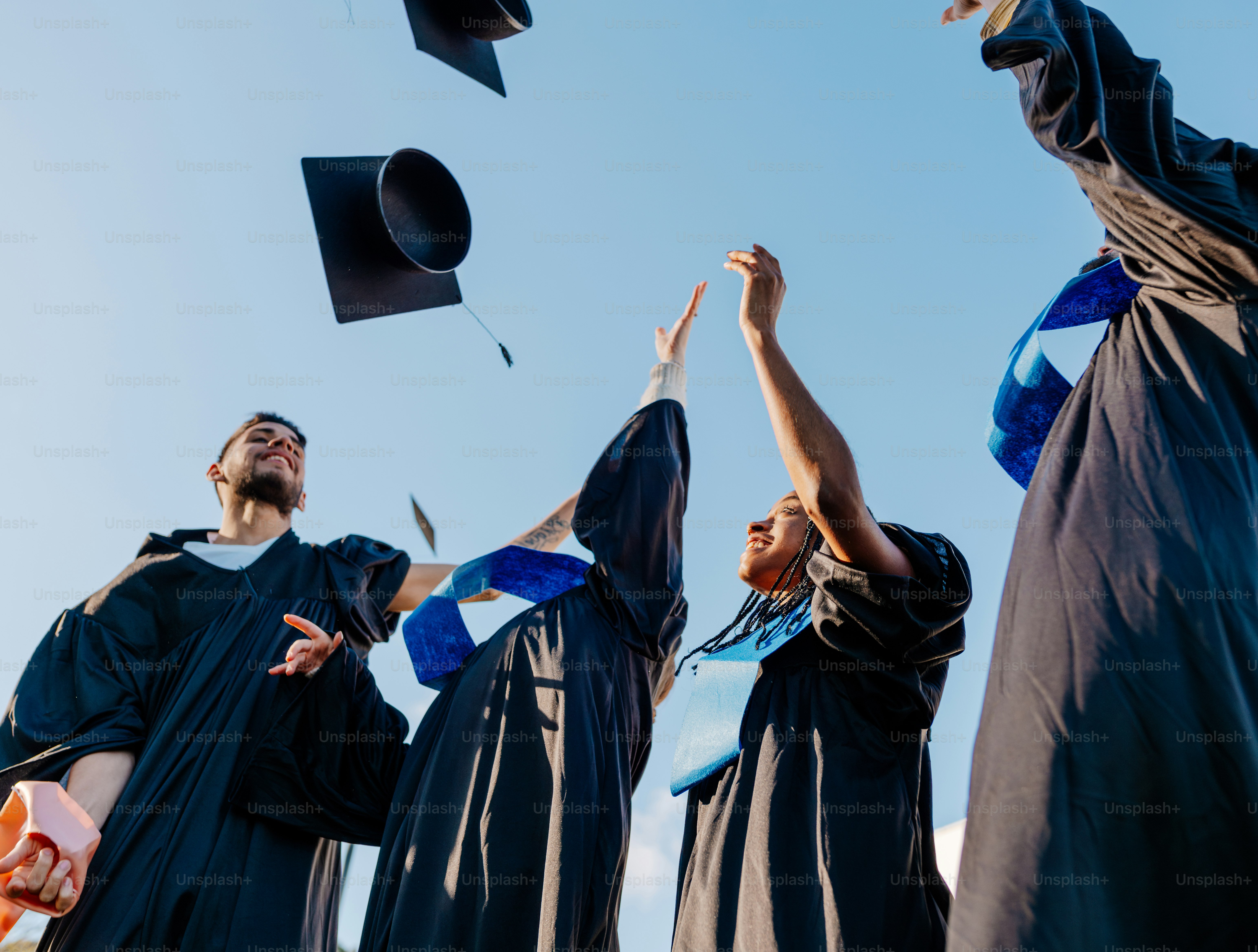 Cap throwing Image on Unsplash