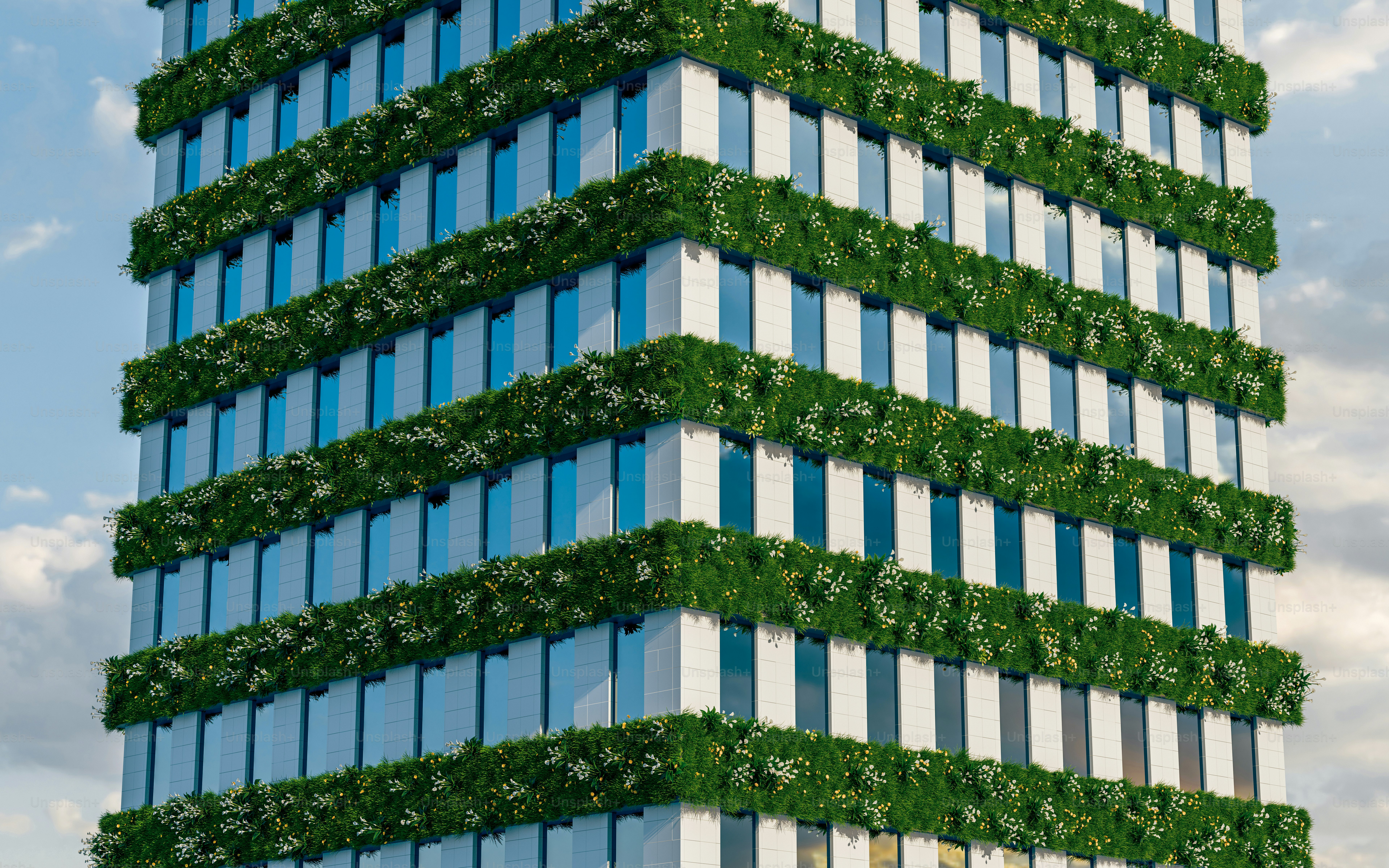 A very tall building with a bunch of plants growing on it photo ...