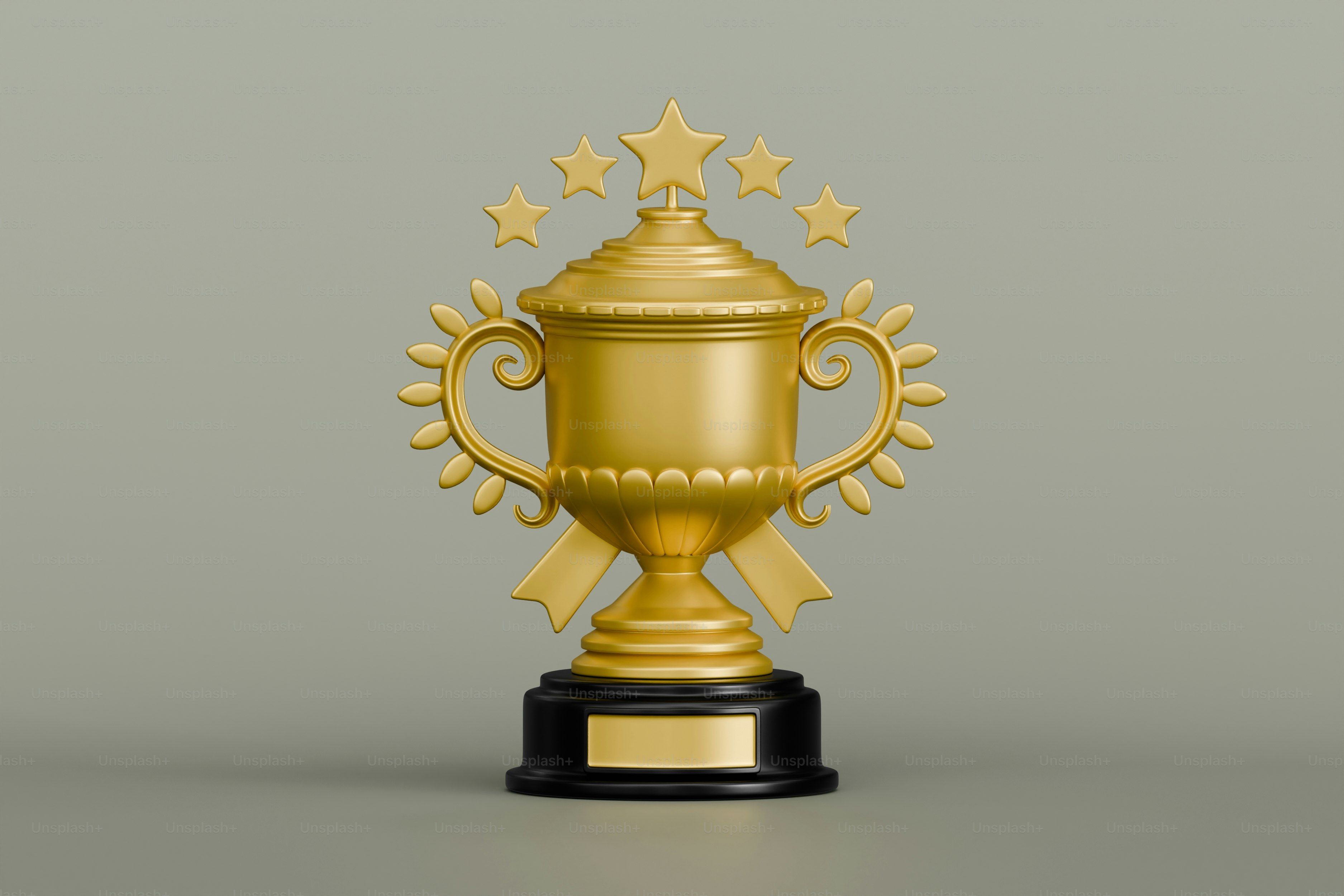 A golden trophy with stars on top of it photo – Victory Image on Unsplash