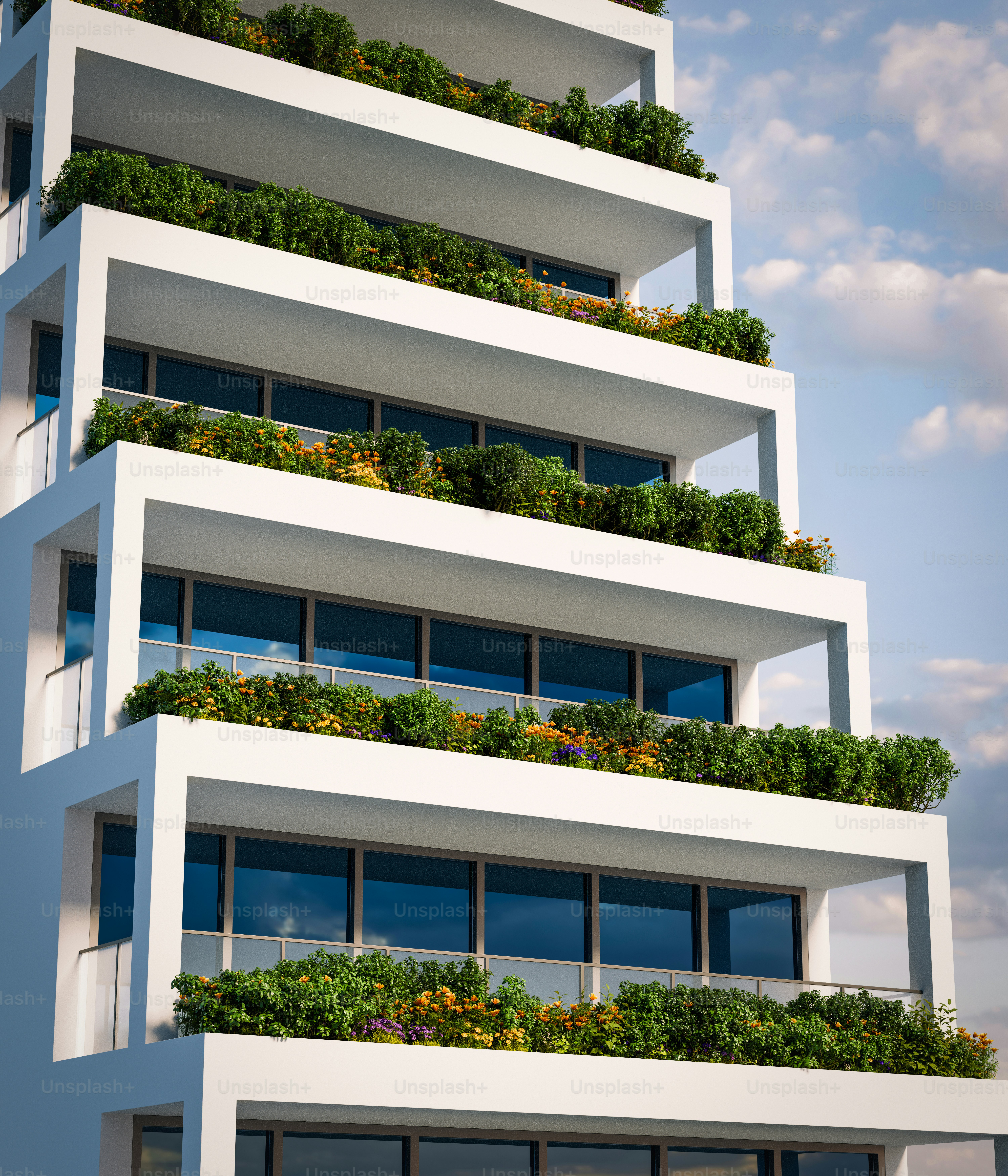 A very tall building with a bunch of plants growing on it photo ...
