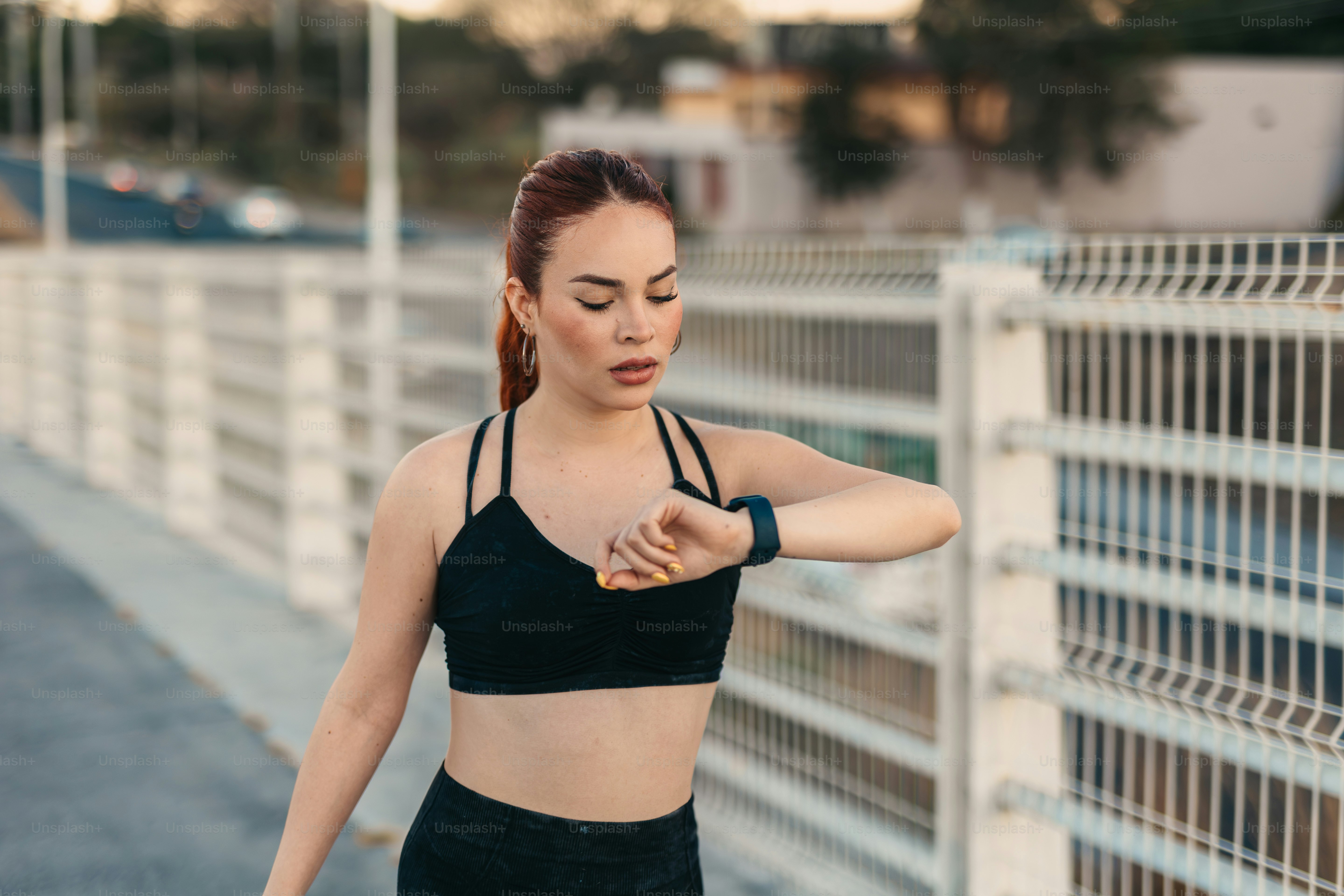 A woman in a sports bra top and leggings photo – Steps counter Image on ...