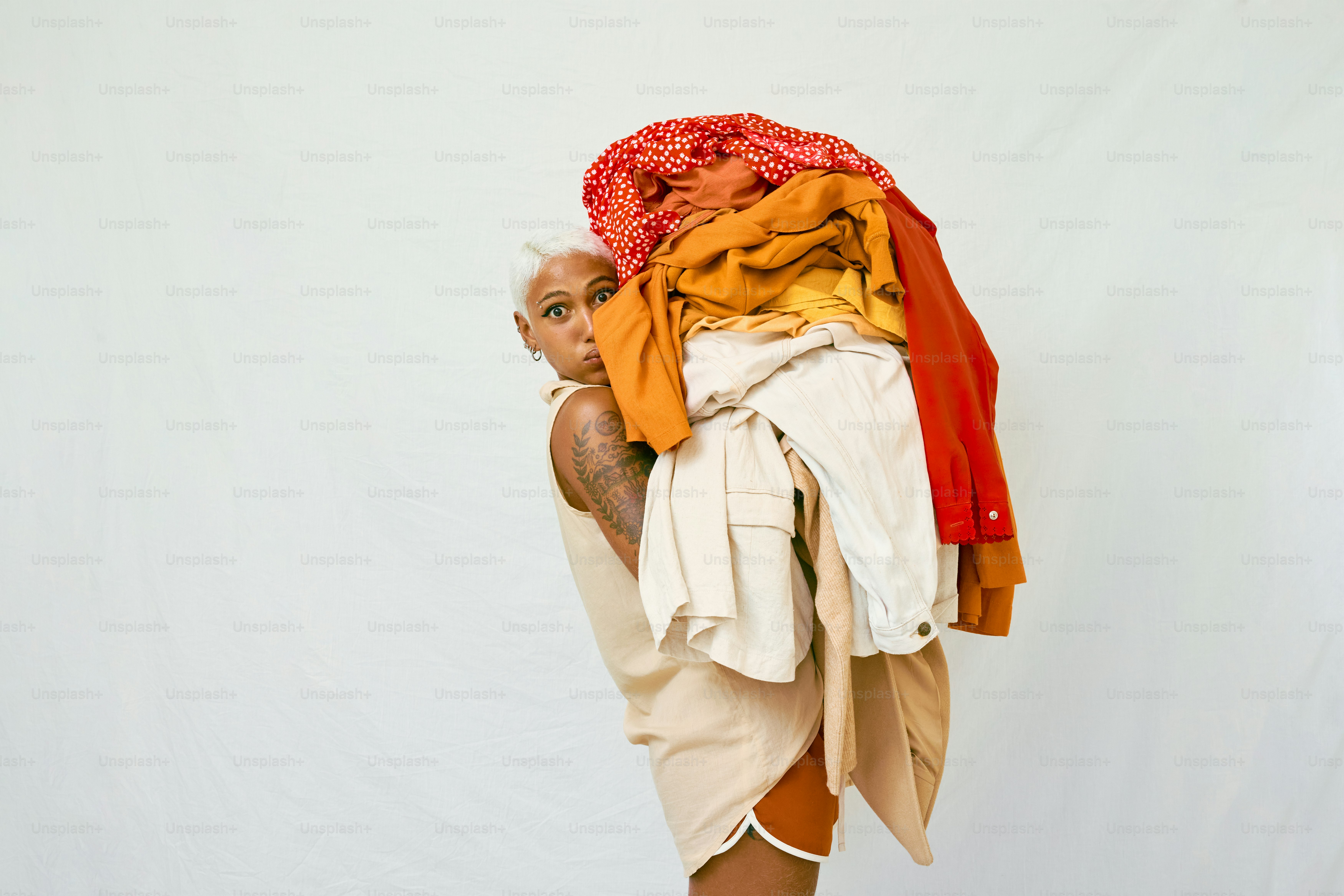 A man with a head scarf wrapped around his body photo – Consumerism ...