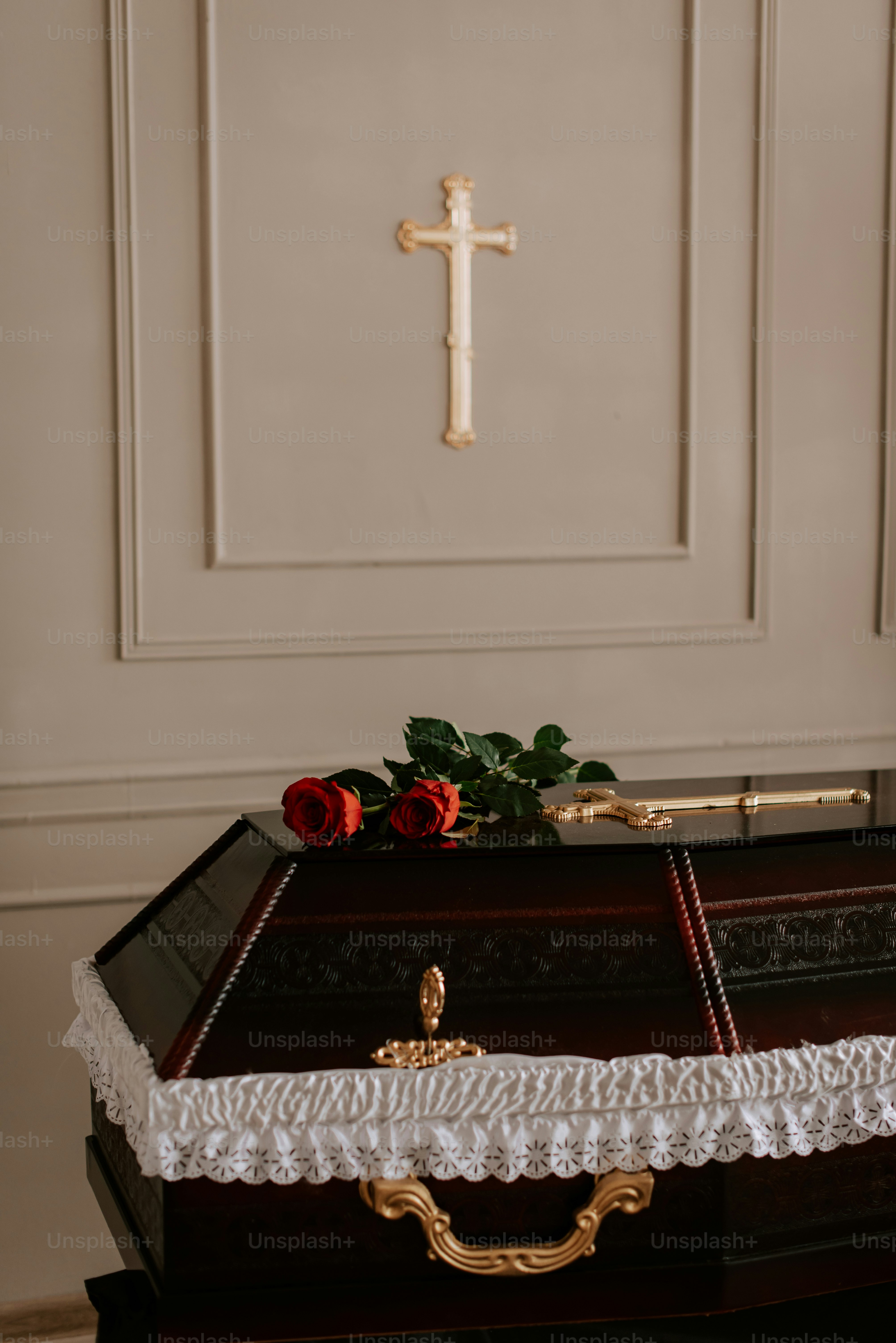 A wooden casket with a cross on top of it photo – Ceremony Image on ...