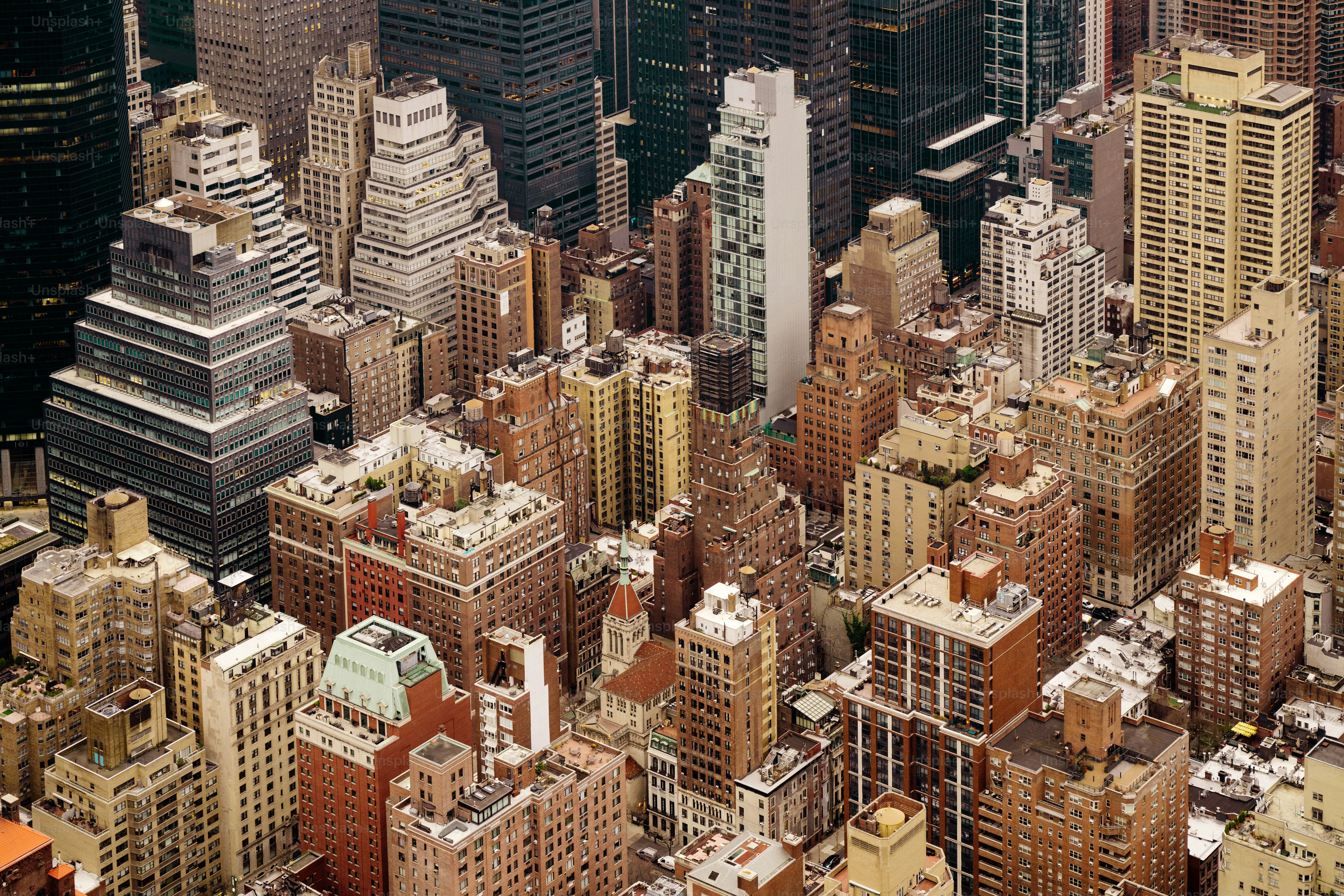 An aerial view of a city with tall buildings photo – United states ...