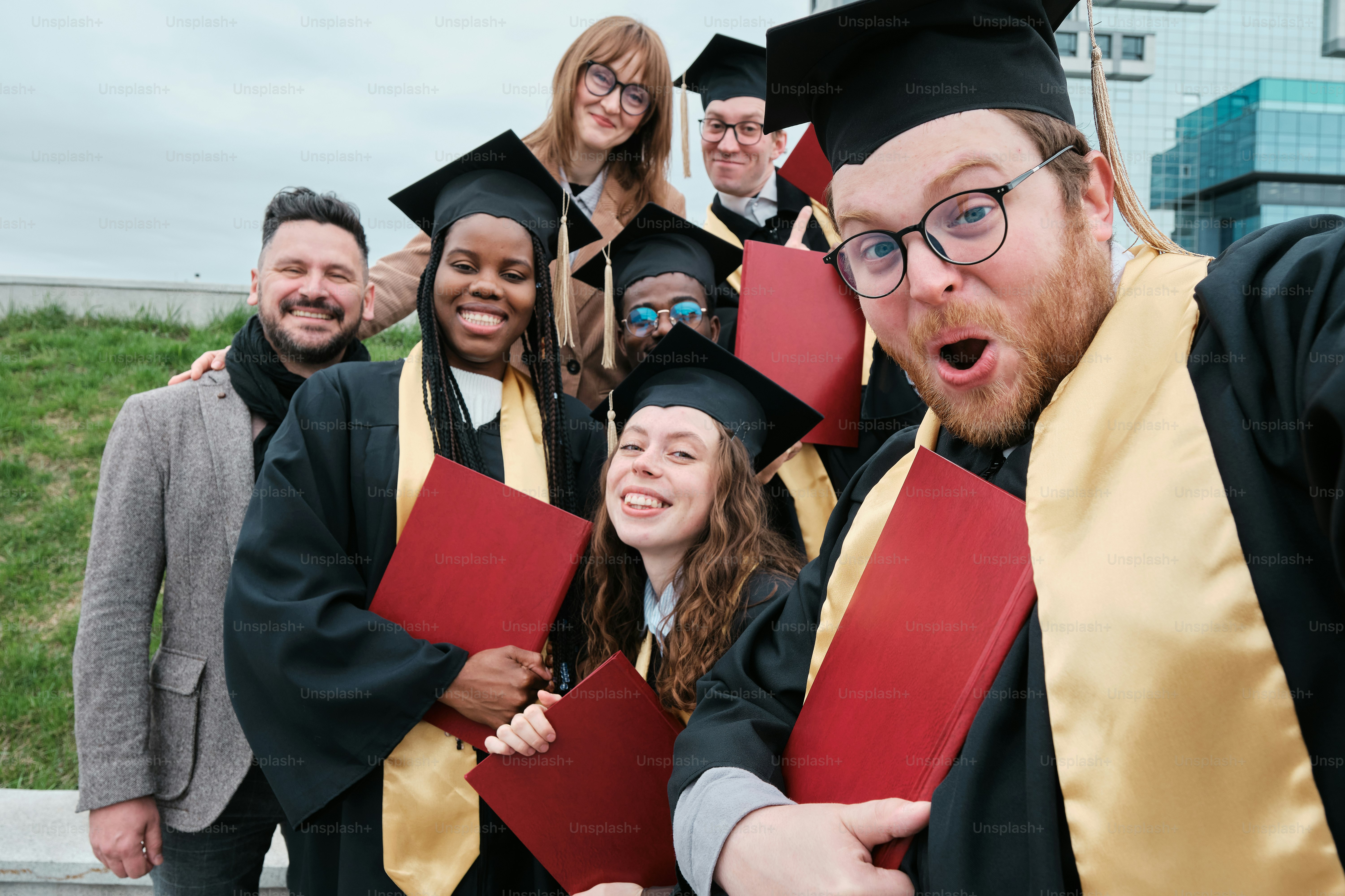 A group of graduates posing for a picture photo – Graduation Image on ...