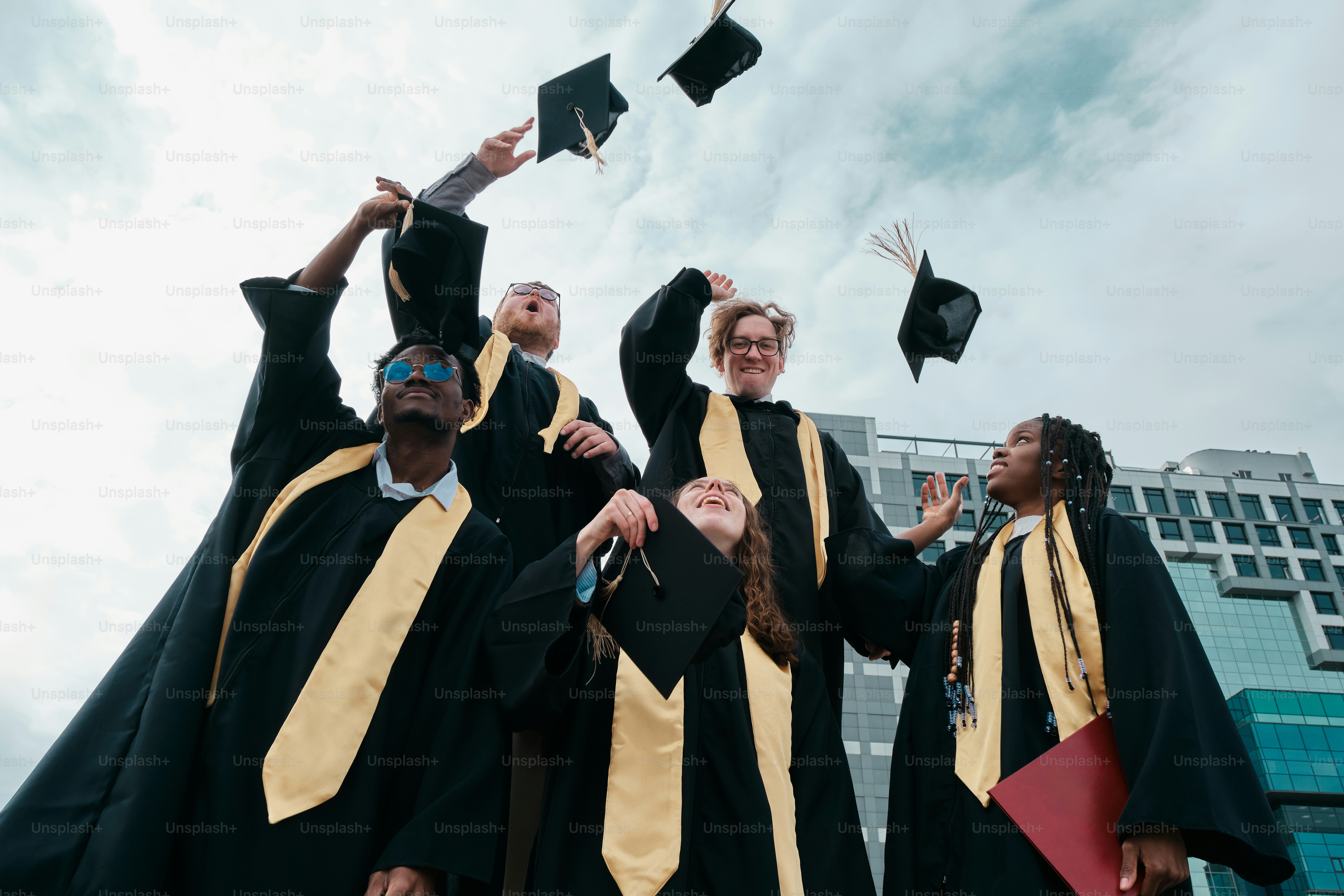 A group of graduates jumping in the air photo – Diploma Image on Unsplash