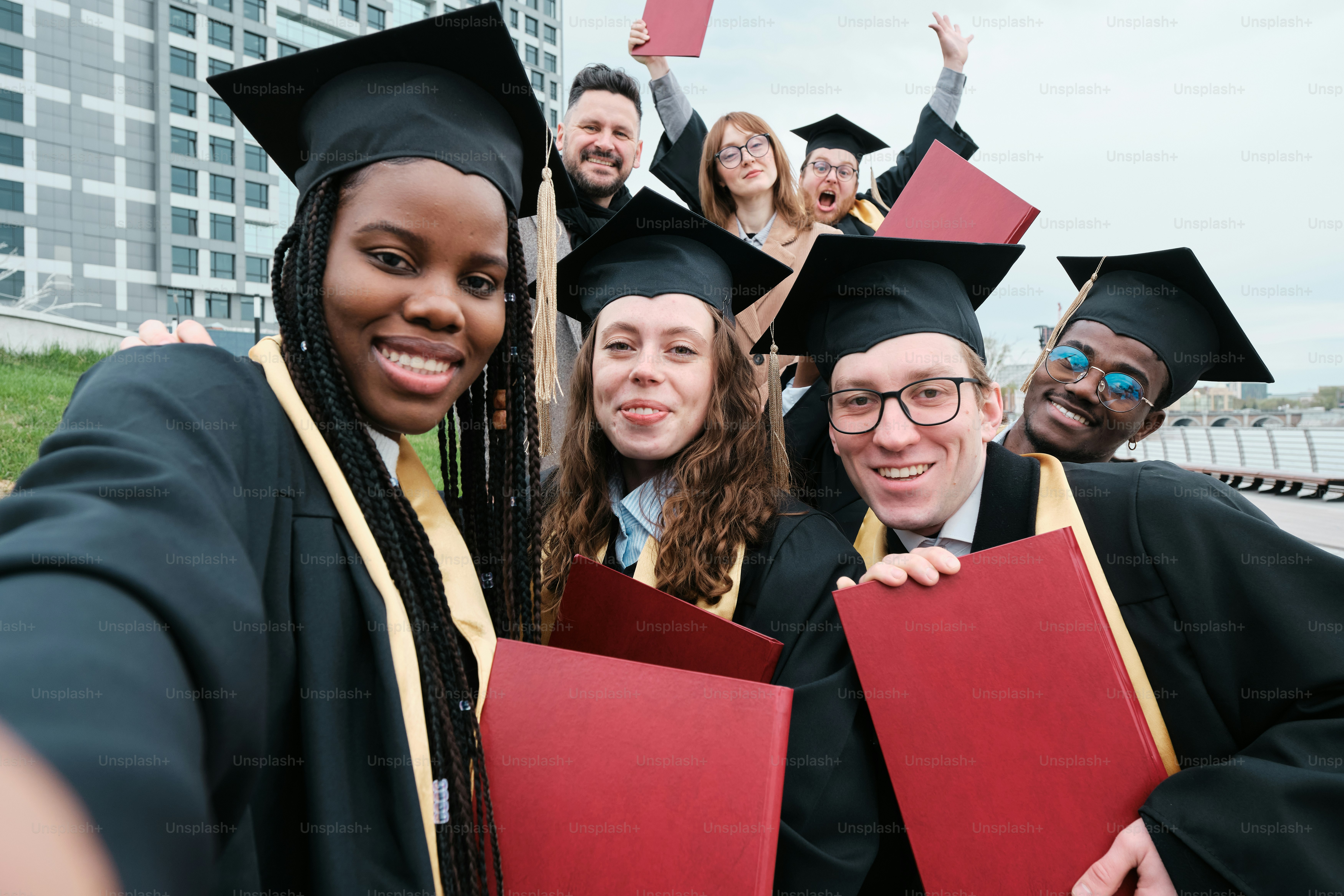 A group of graduates posing for a picture photo – Graduation Image on ...