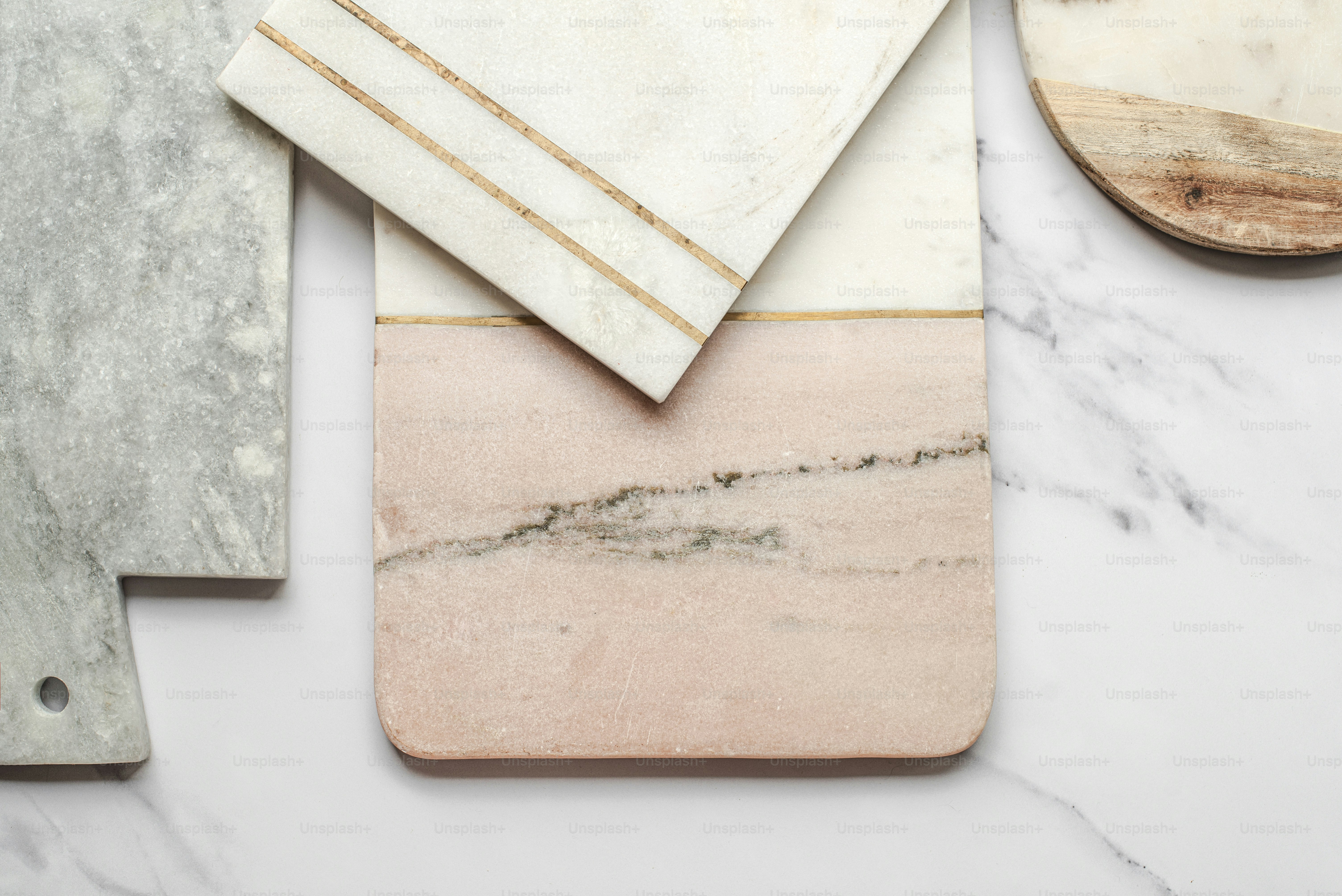 Marble cutting boards and cutting boards on a marble counter top photo ...