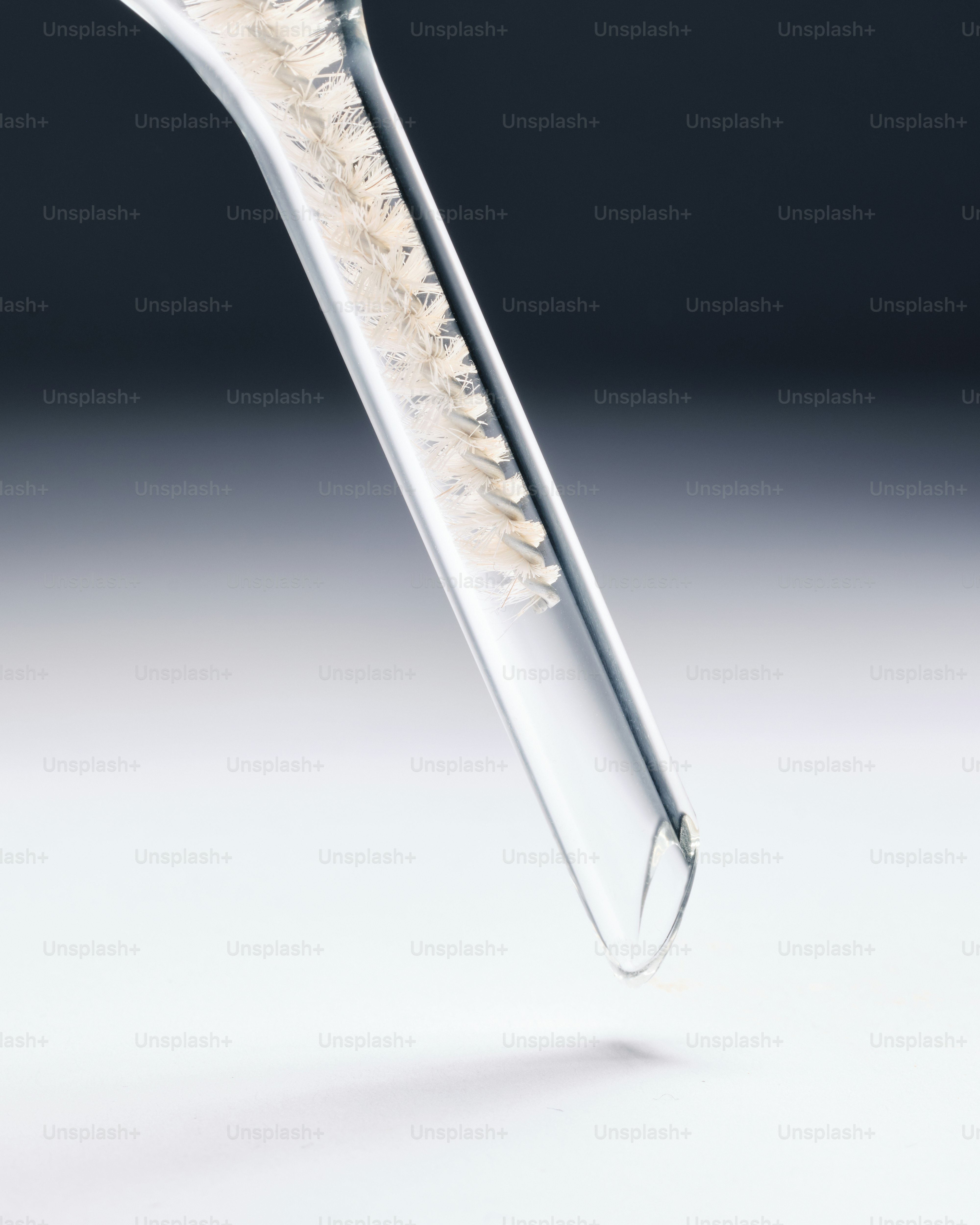 A close up of a toothbrush with toothpaste on it photo – Chemistry ...