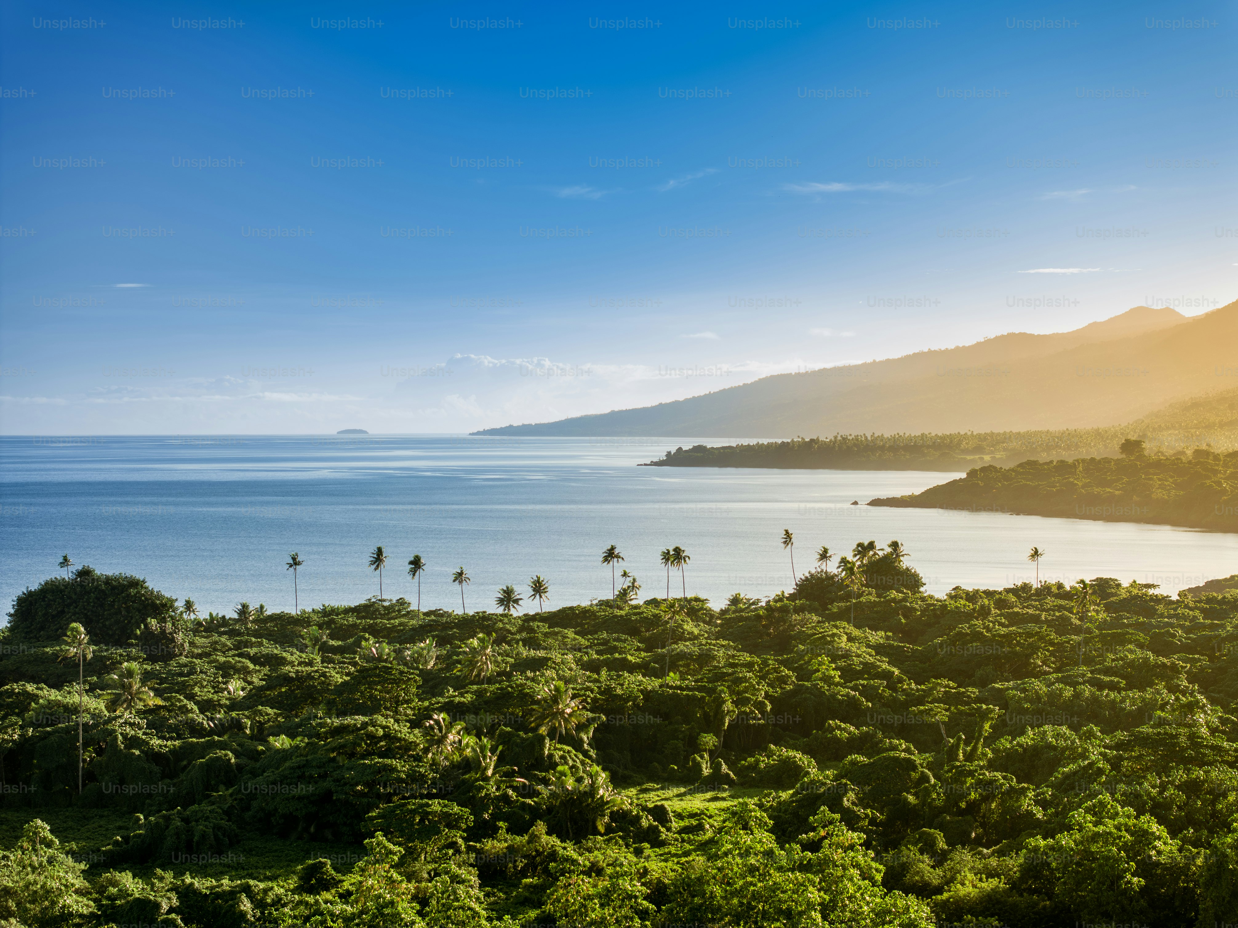 A view of the ocean and mountains from a hill photo – Fiji Image on ...