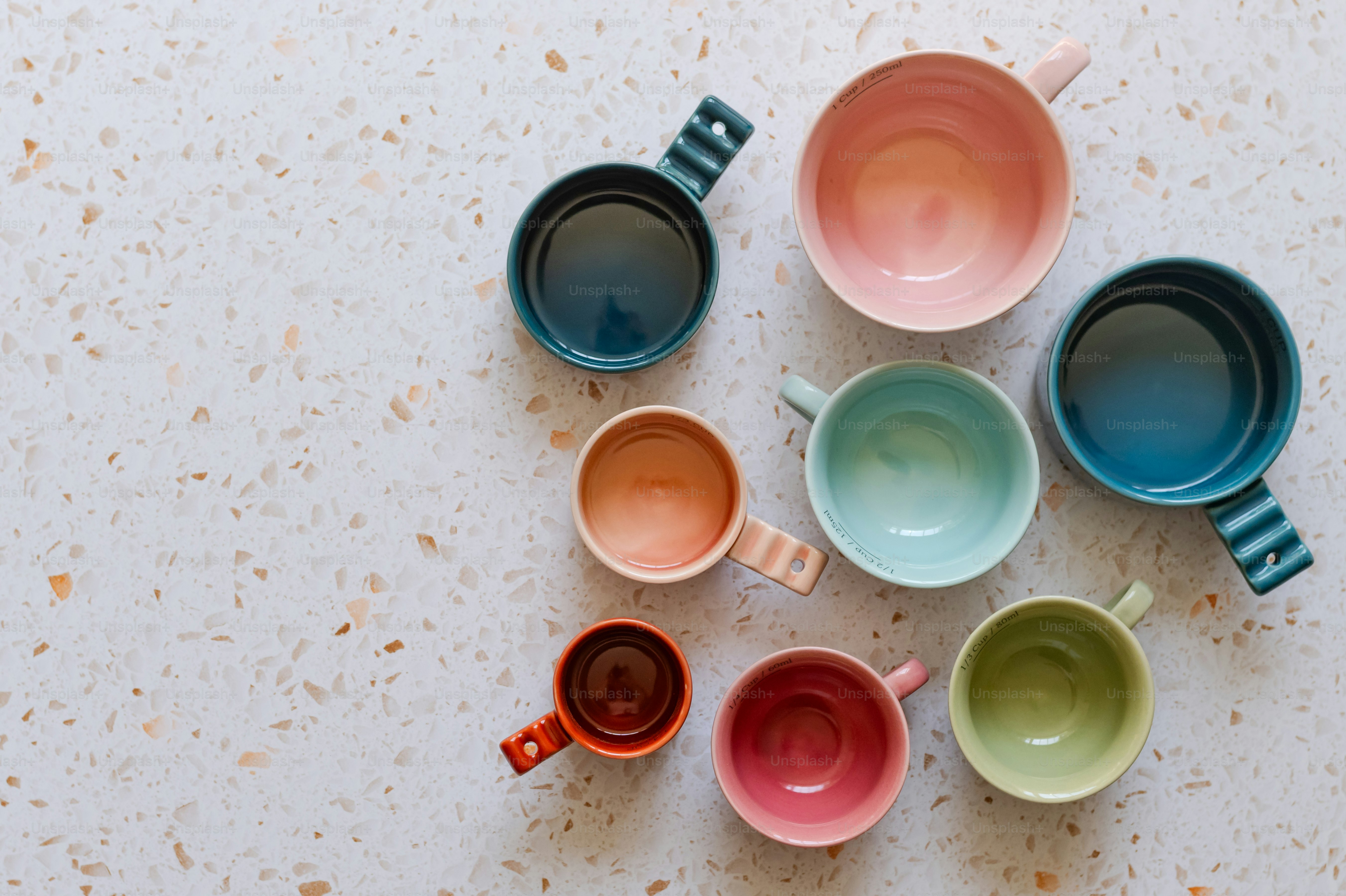 A group of cups sitting on top of a table photo – Crockery Image on ...