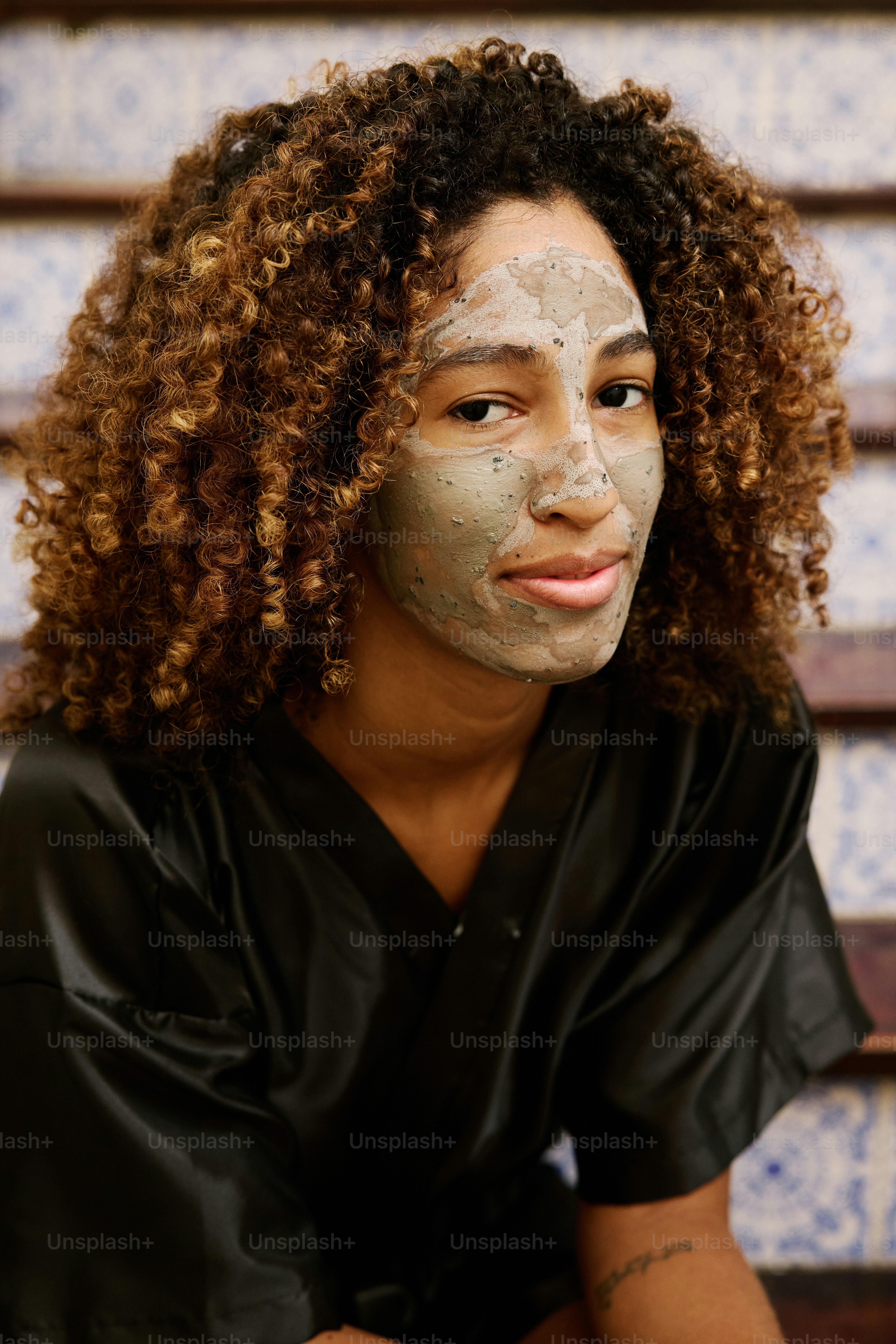 A woman with a facial mask on her face photo – Portrait Image on Unsplash