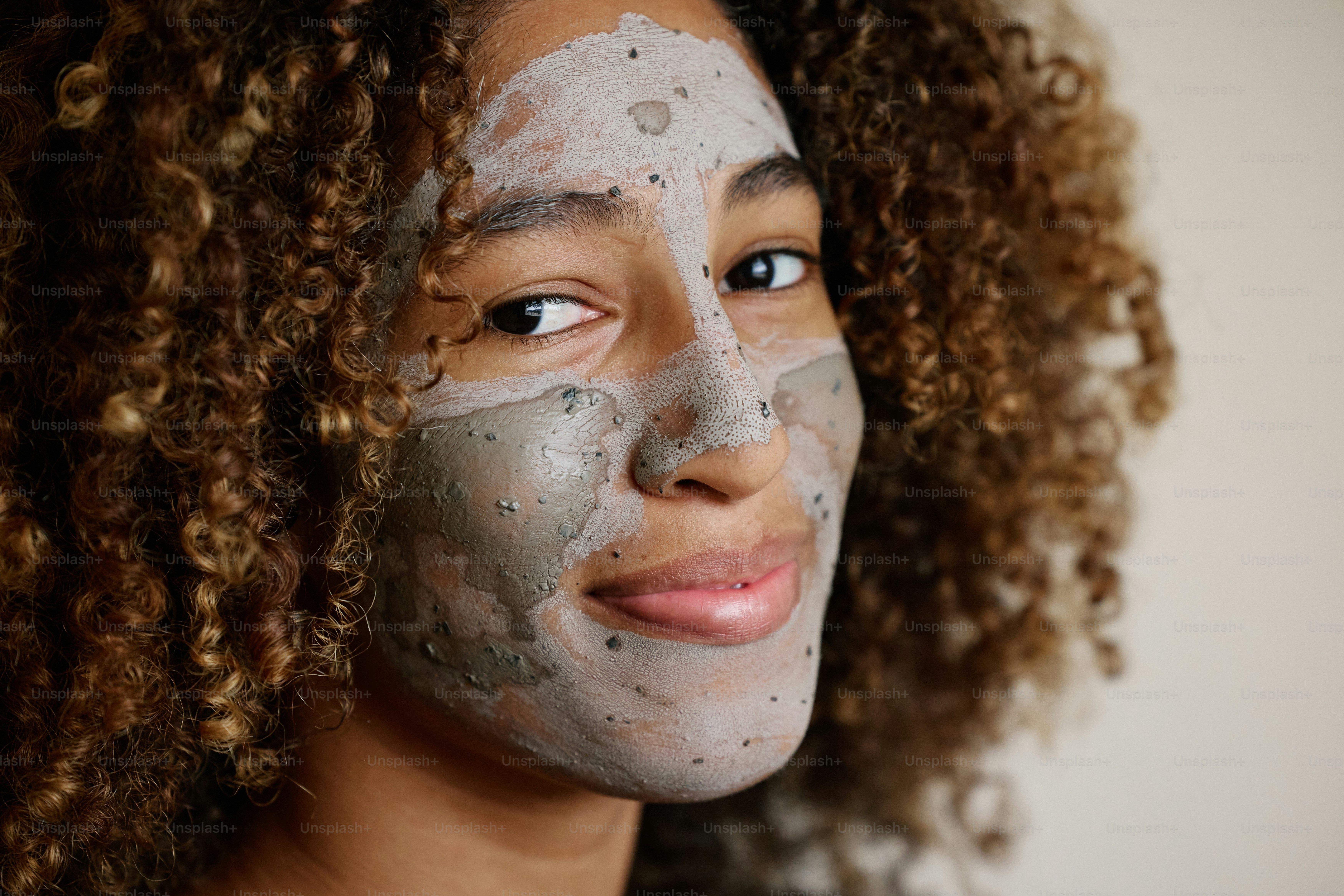 A woman with a facial mask on her face photo – Portrait Image on Unsplash