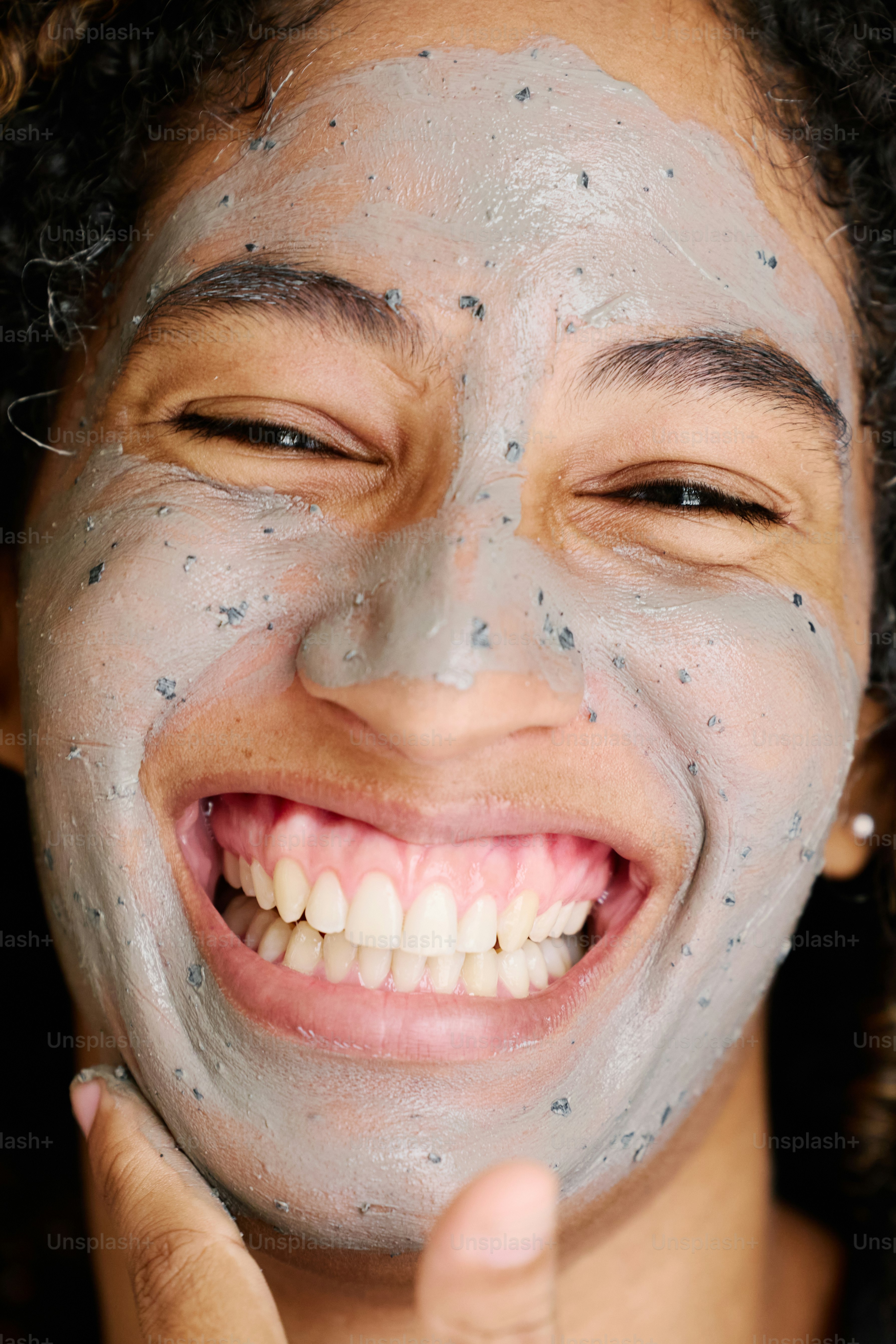 A woman with a white face mask smiling photo – Face mask Image on Unsplash