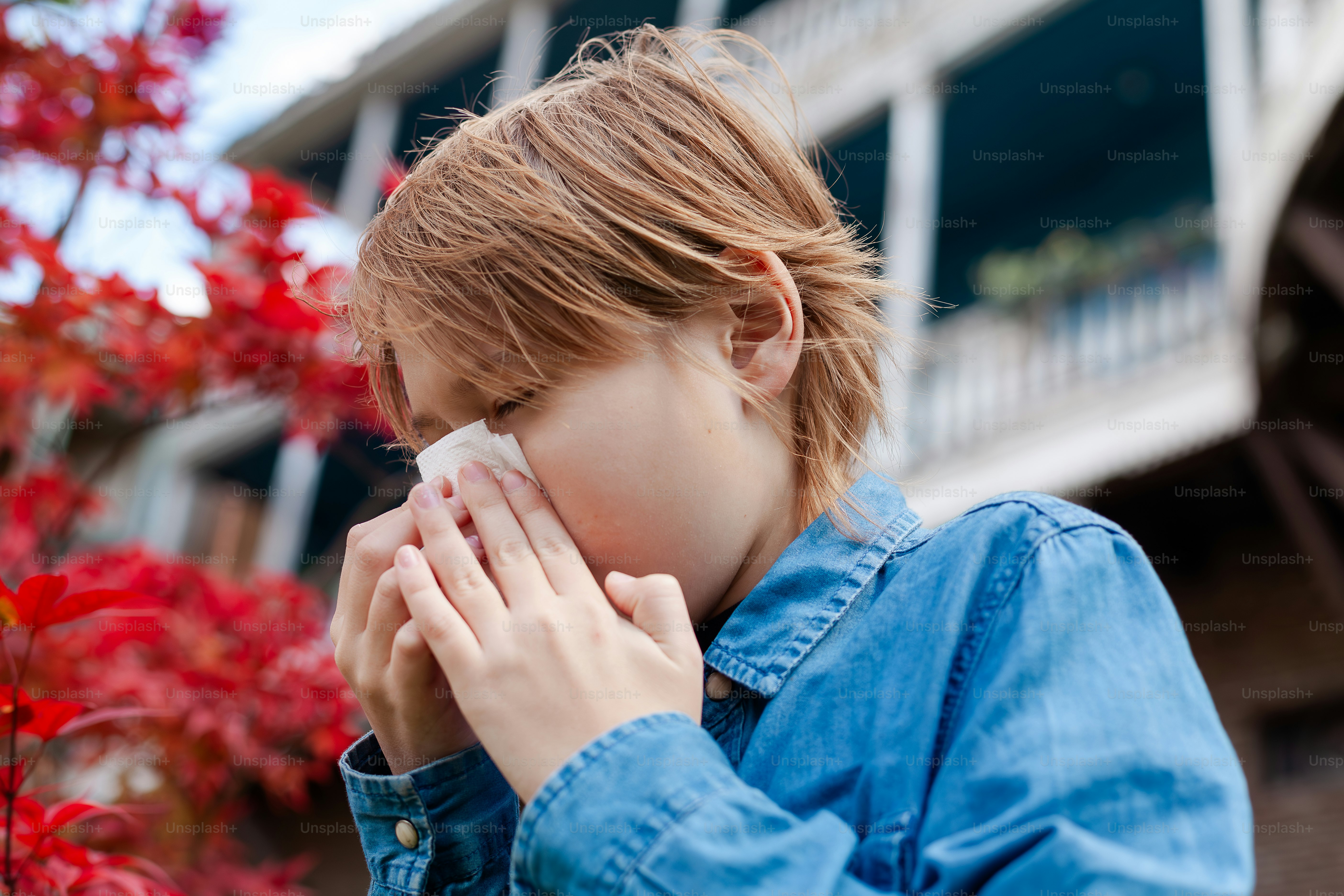 A young girl covers her face with her hands photo – Health Image on ...