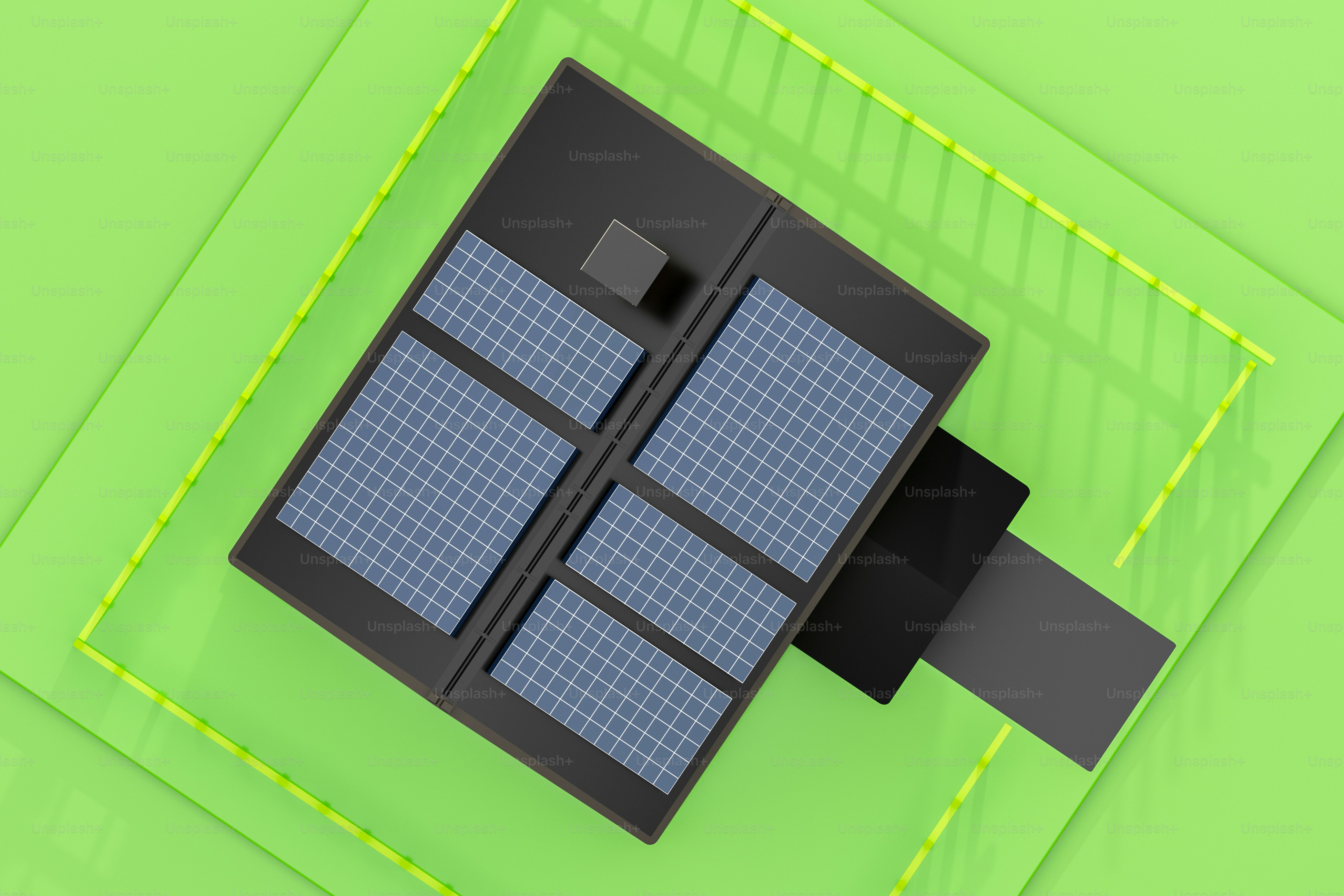 An aerial view of a solar panel on a green surface photo ...