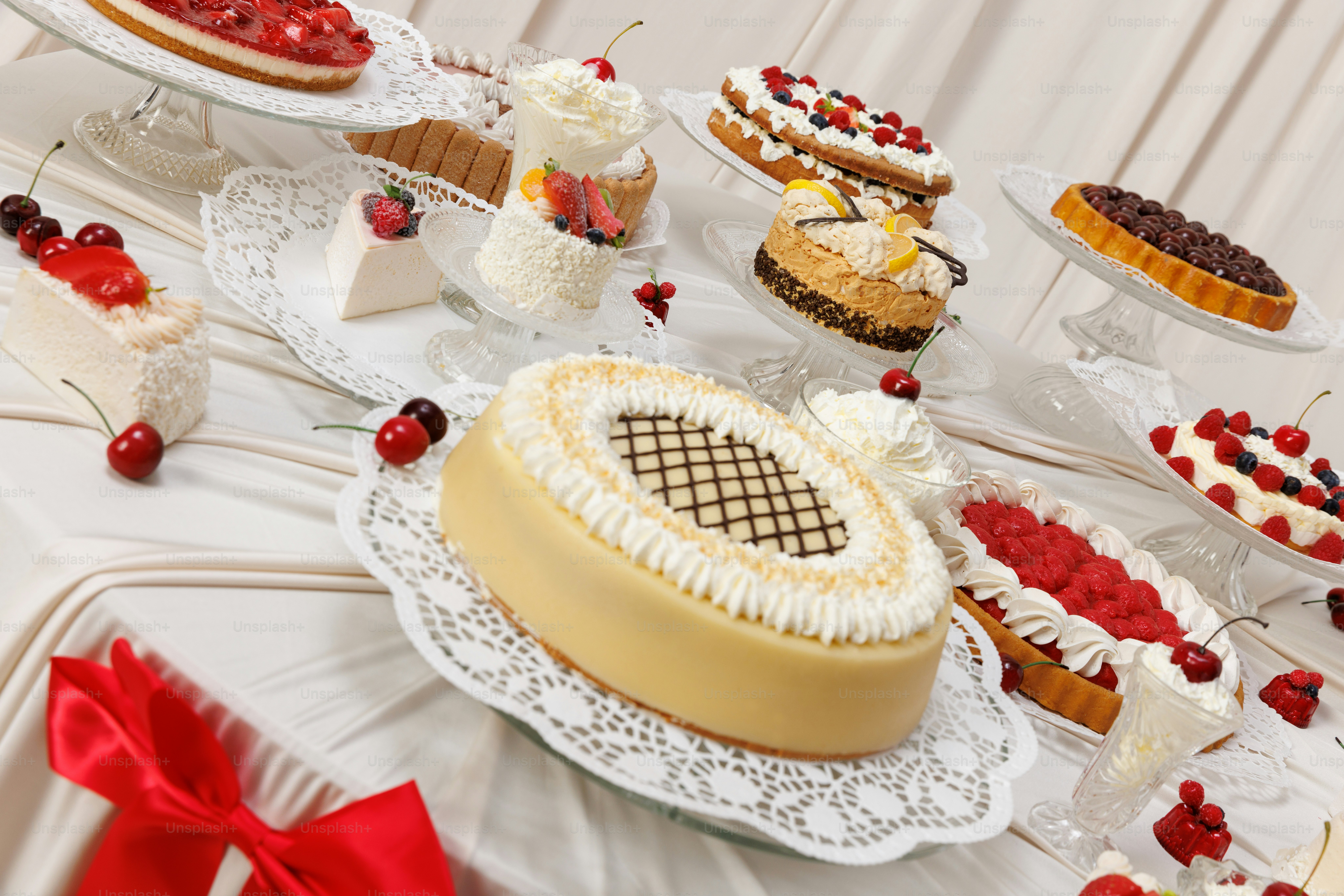 A table topped with lots of cakes and pies photo – Cakes Image on Unsplash