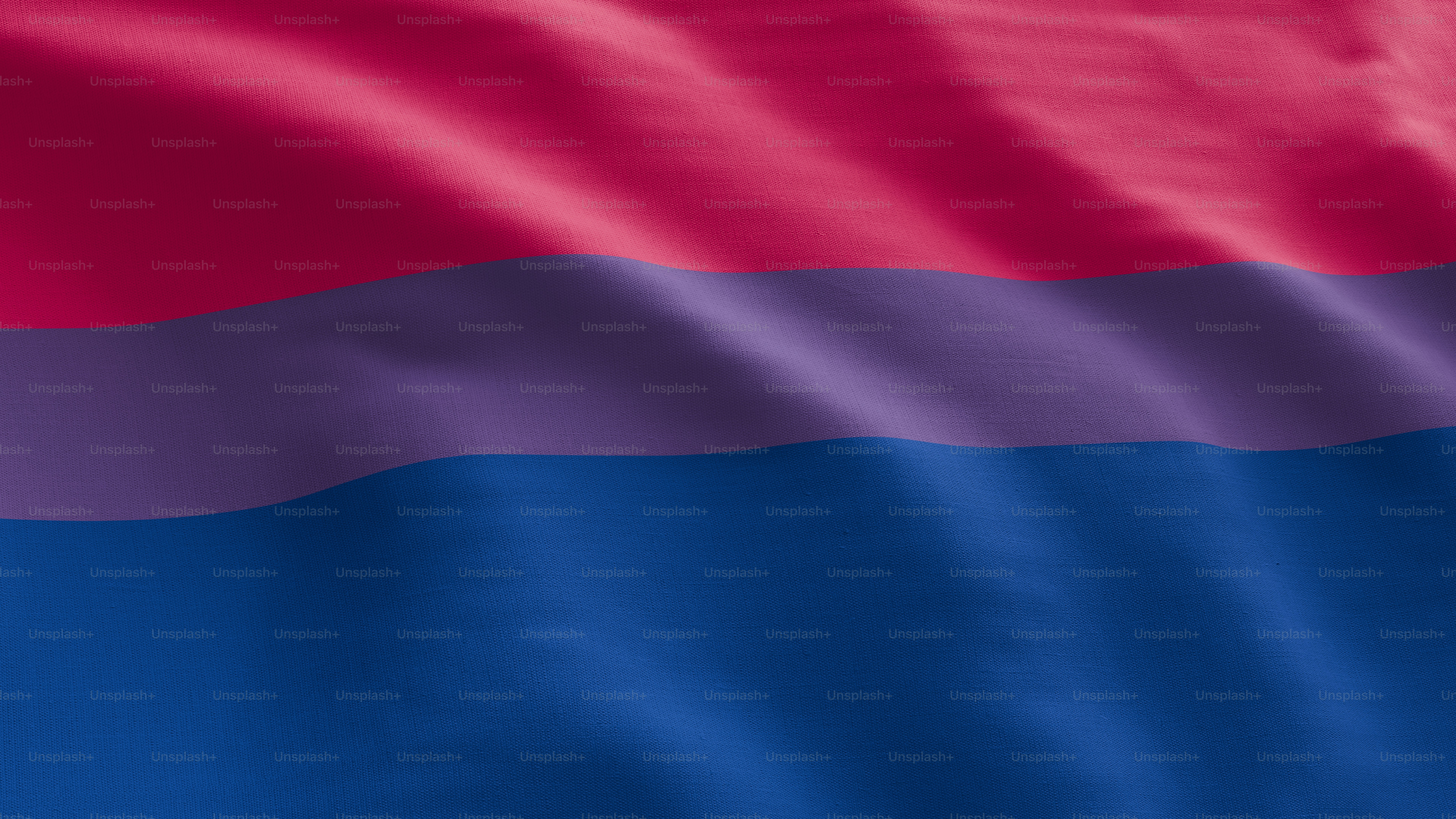A close up of a red and blue flag photo – Pride flags Image on Unsplash