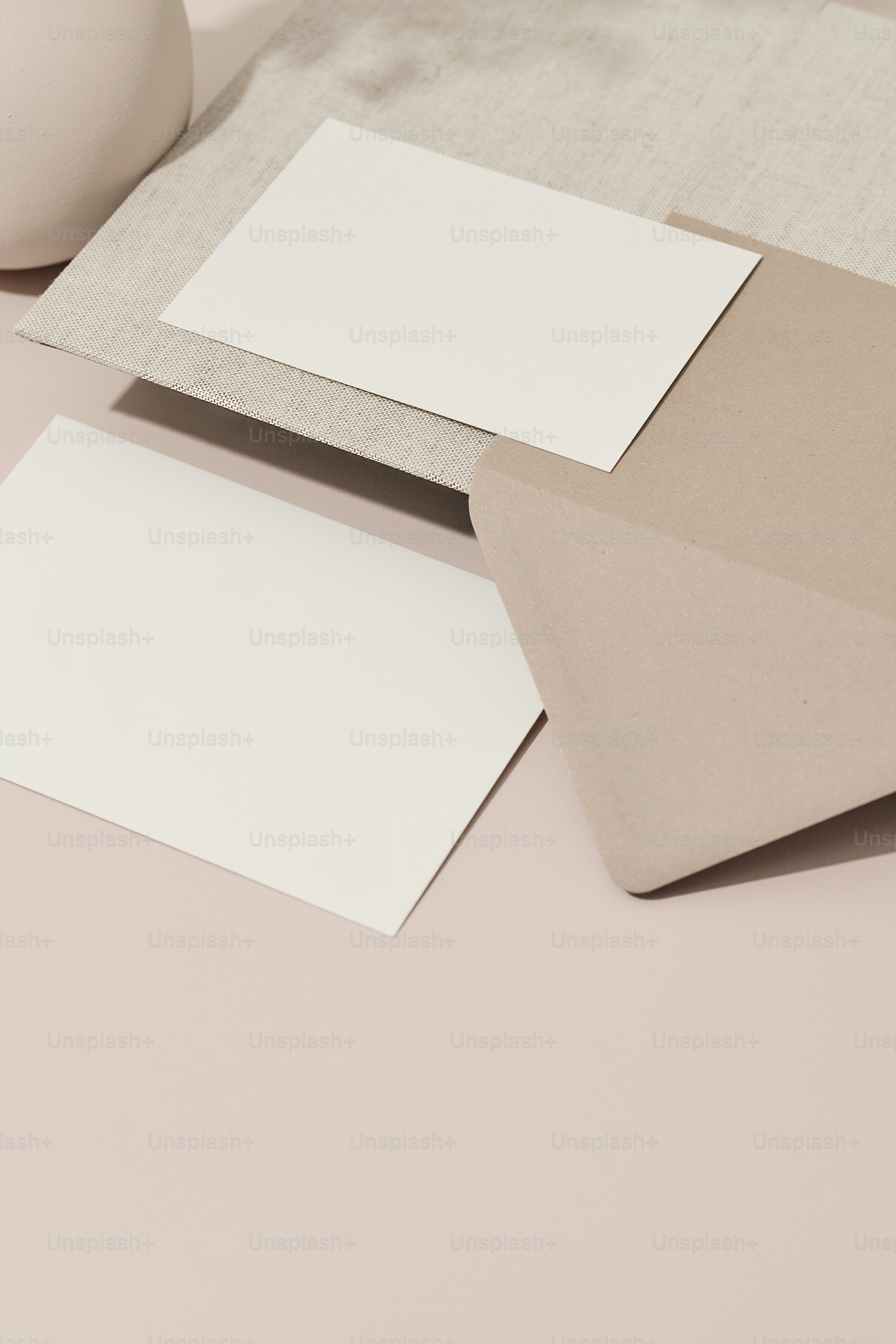 Two envelopes and a piece of paper on a table photo – Invitations Image ...