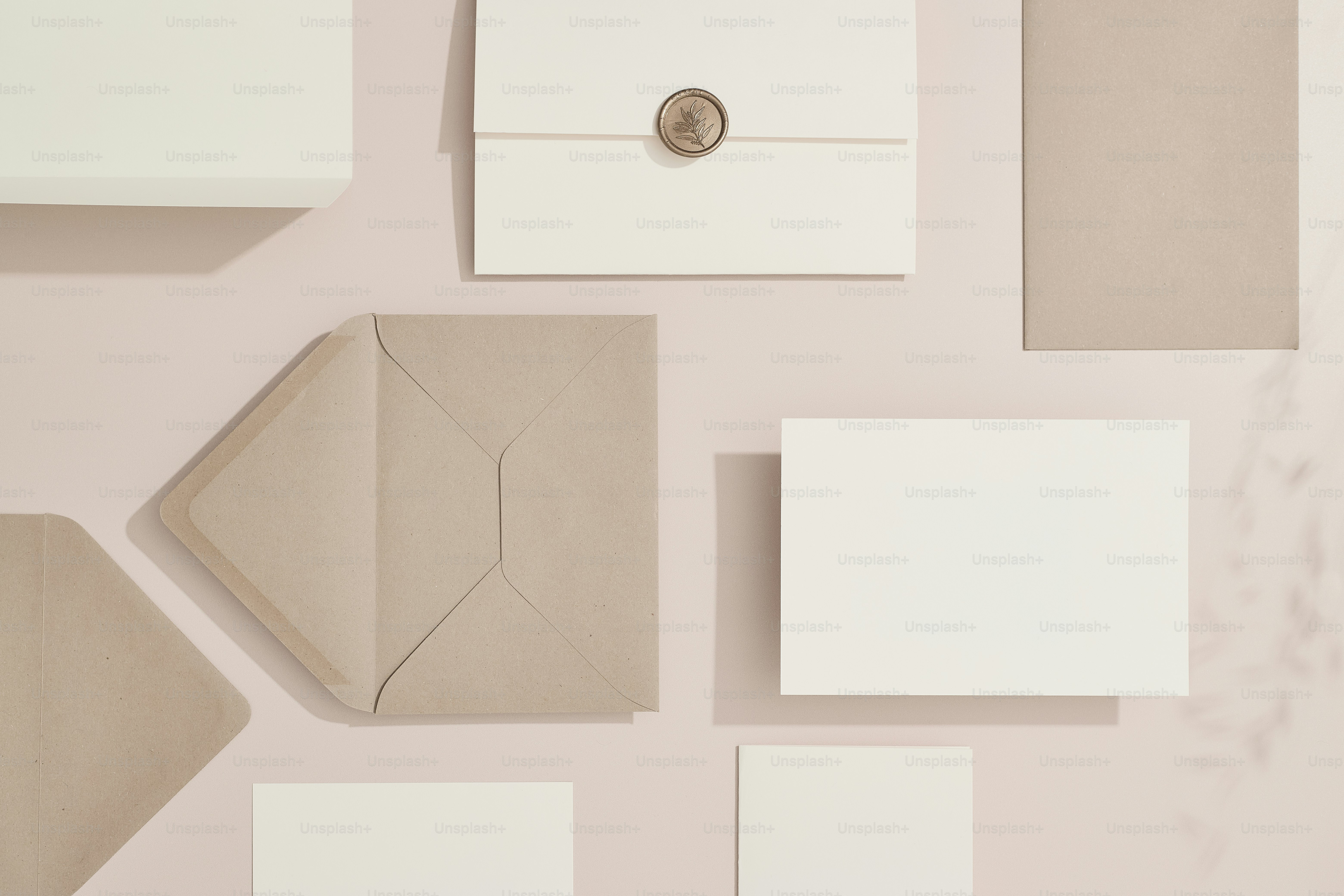 Two envelopes and a piece of paper on a table photo – Invitations Image ...