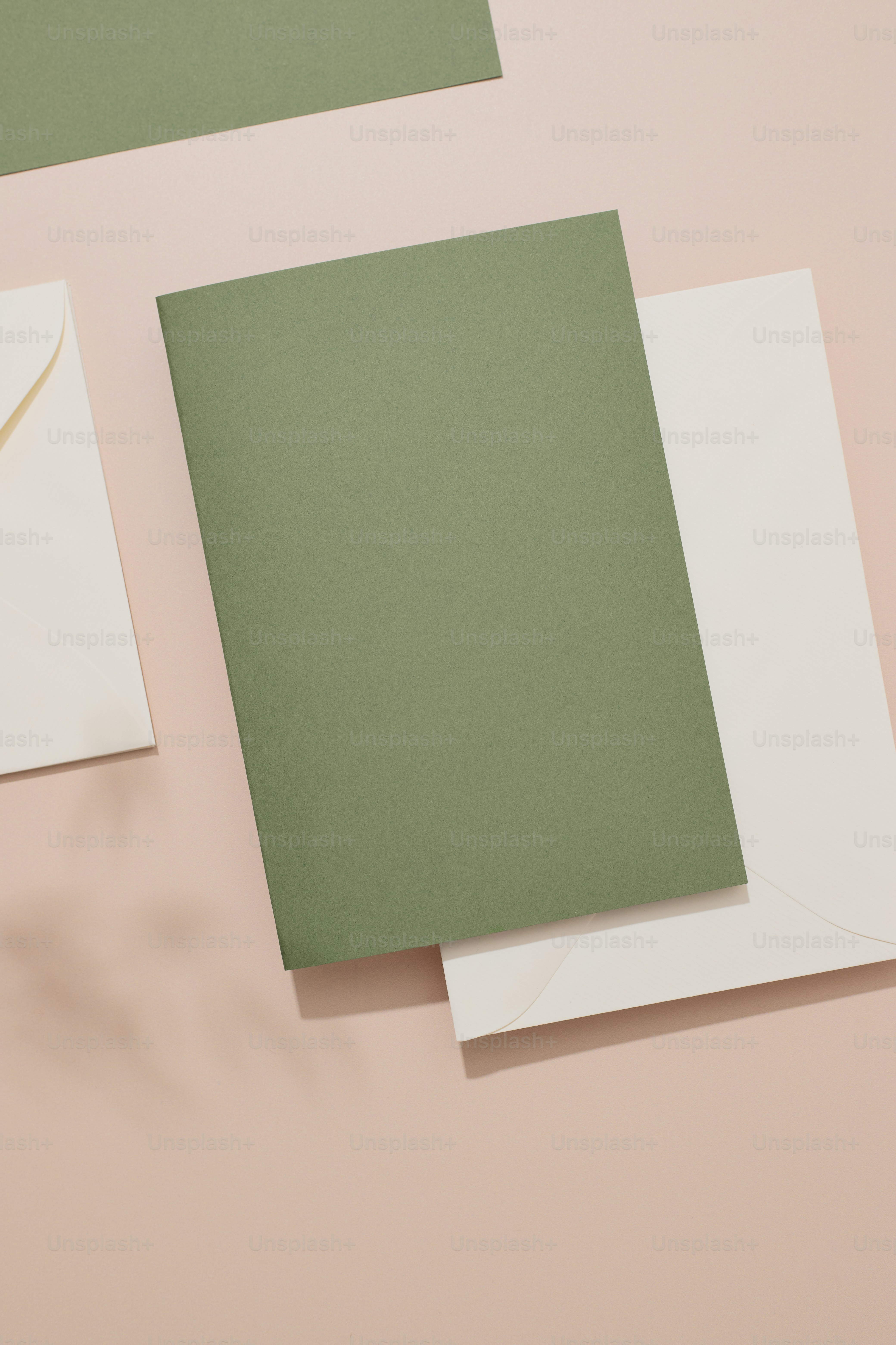 Two envelopes and a piece of paper on a table photo – Invitations Image ...