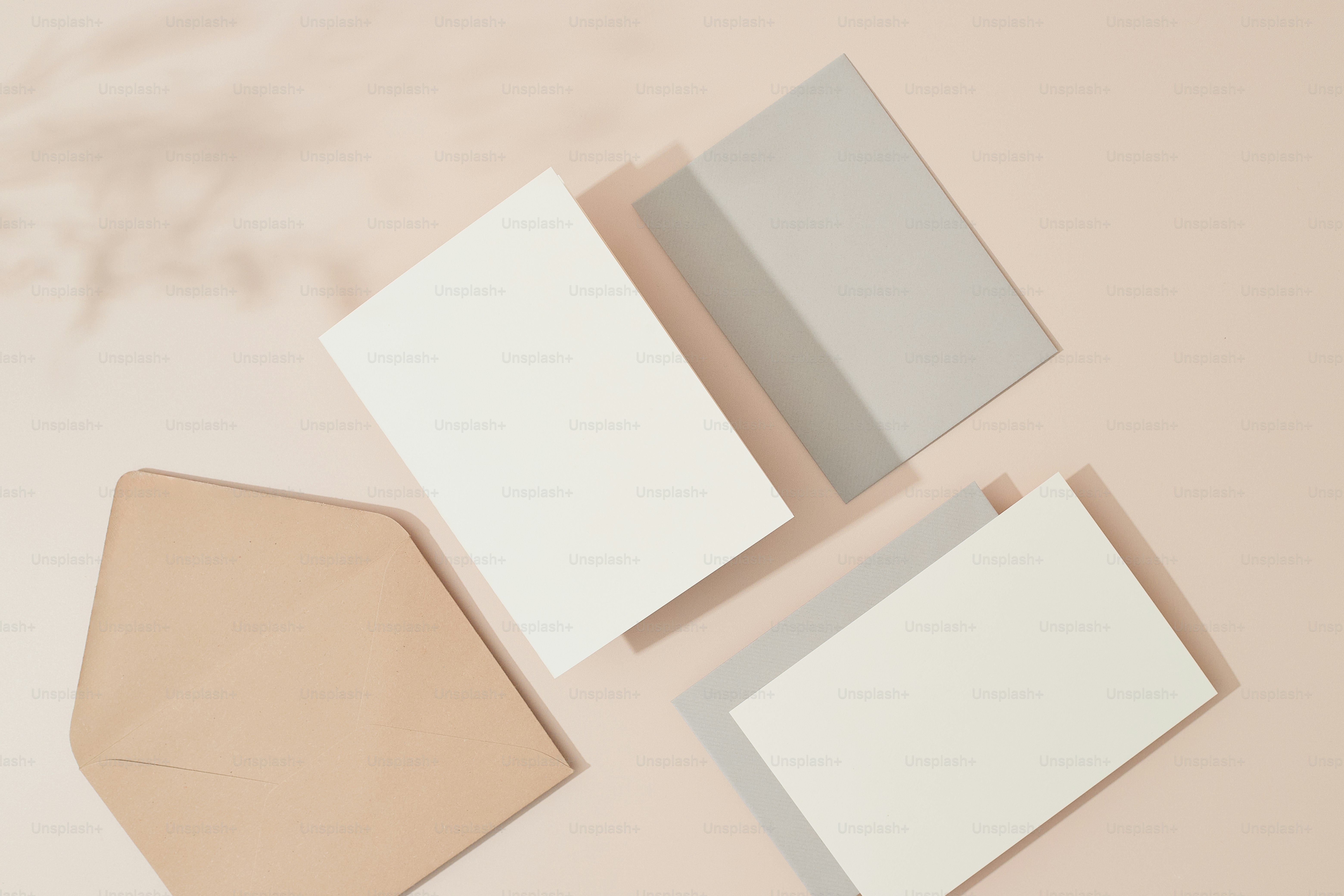 Two envelopes and a piece of paper on a table photo – Invitations Image ...