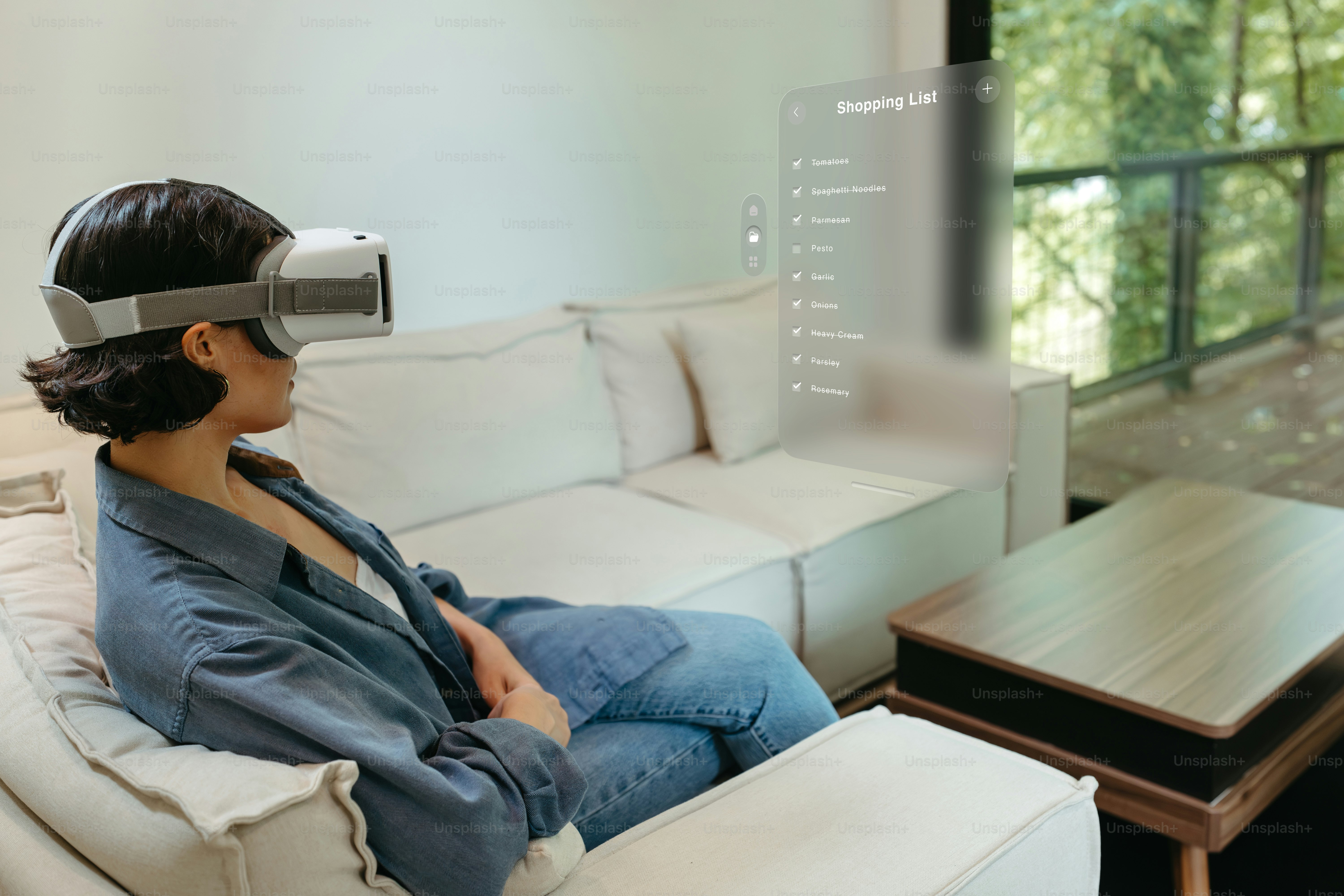 A woman sitting at a desk in front of a computer monitor photo – Lightroom Image on Unsplash