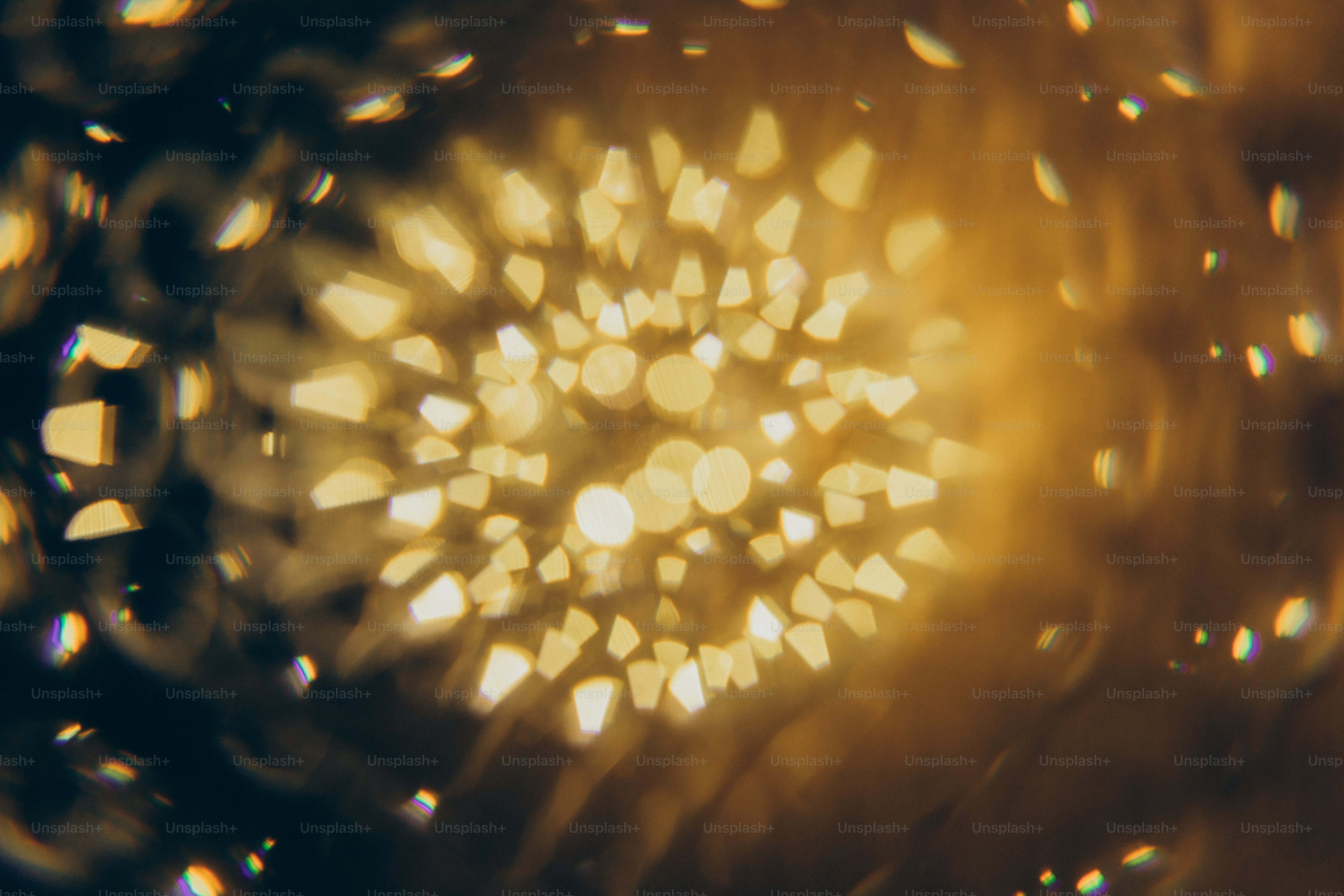 A close up view of a yellow light photo – Bokeh abstract Image on Unsplash