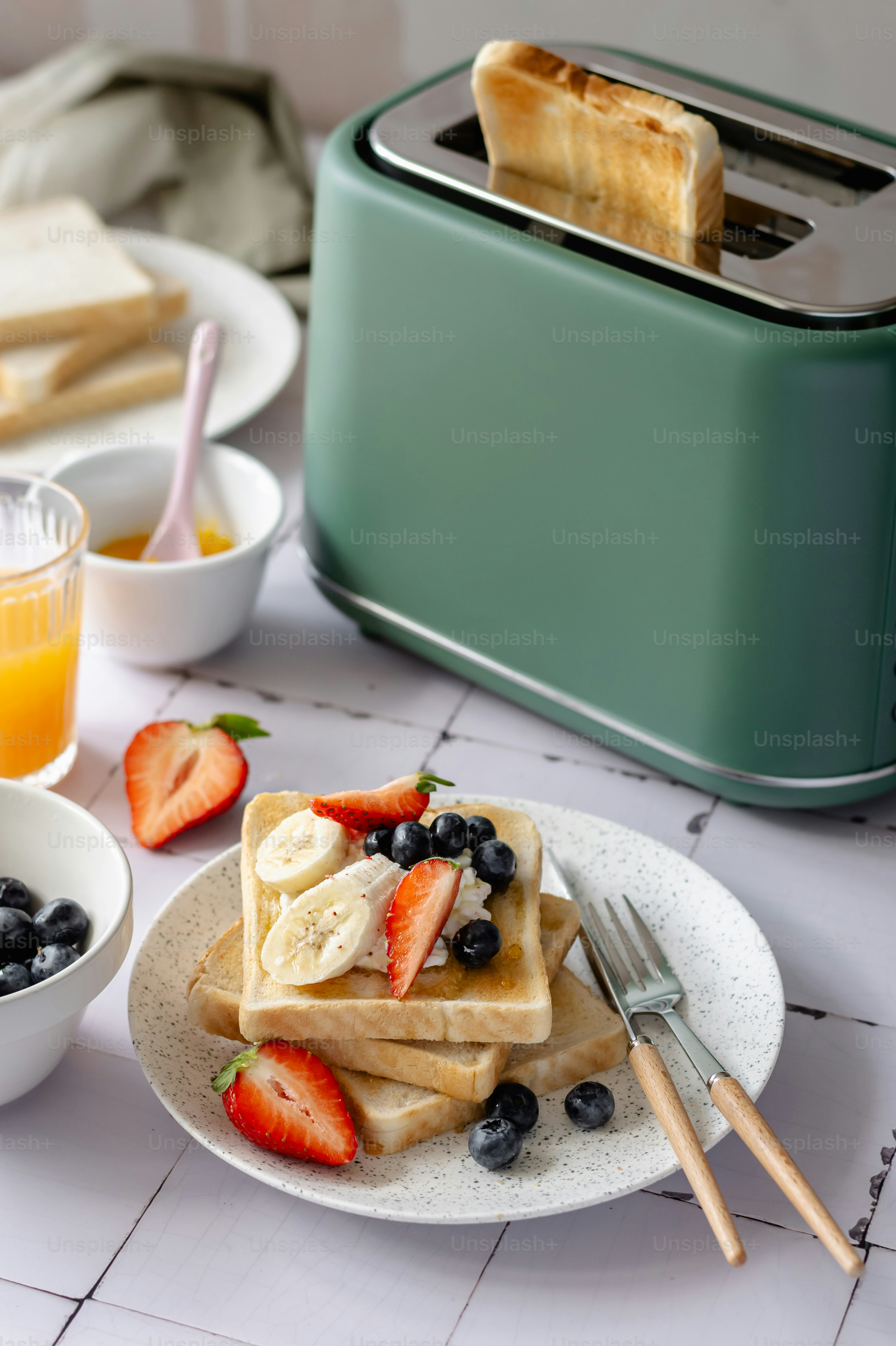 A plate of fruit and toast on a table photo – Food Image on Unsplash