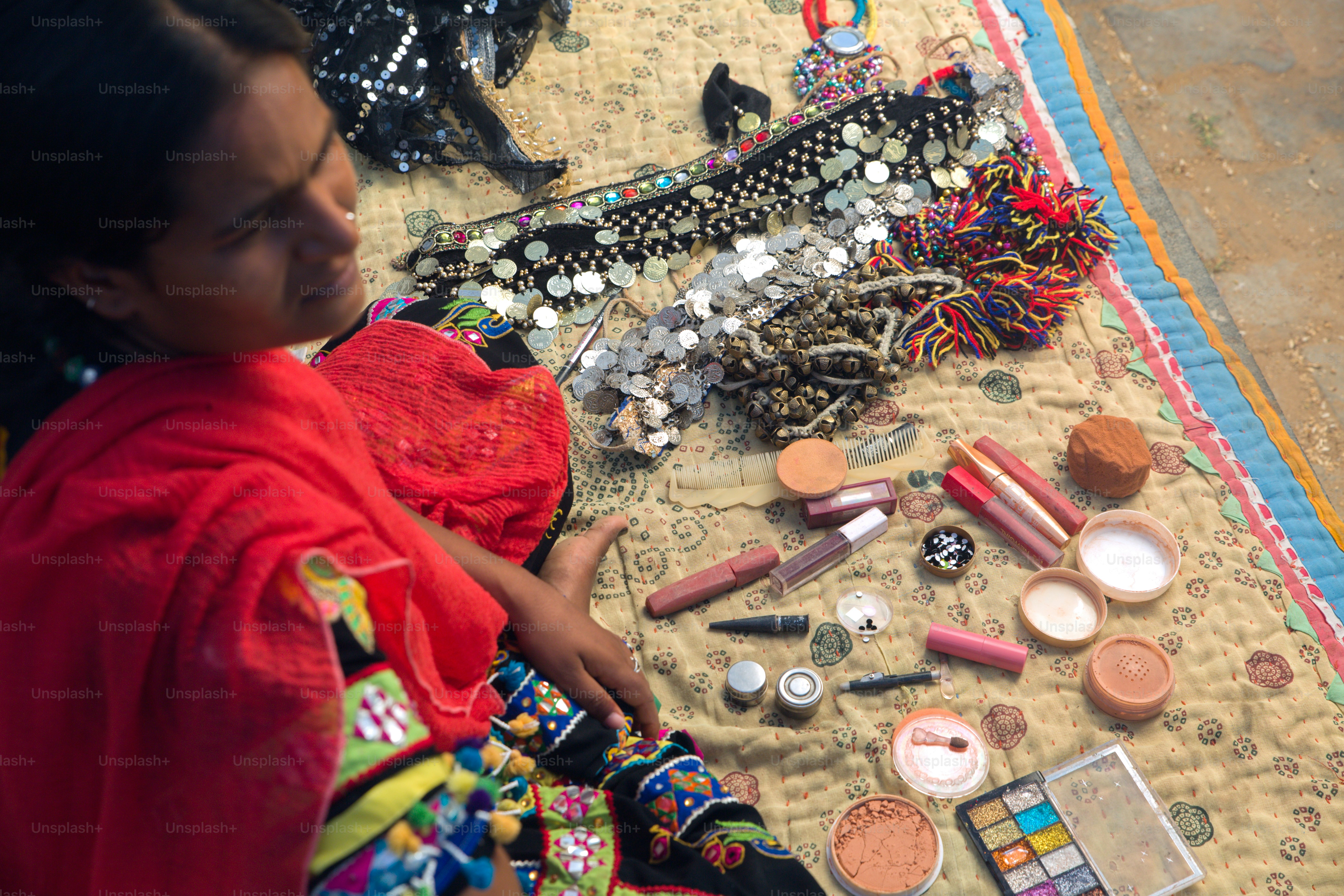 A little girl sitting on the ground with a lot of makeup photo – Hot ...