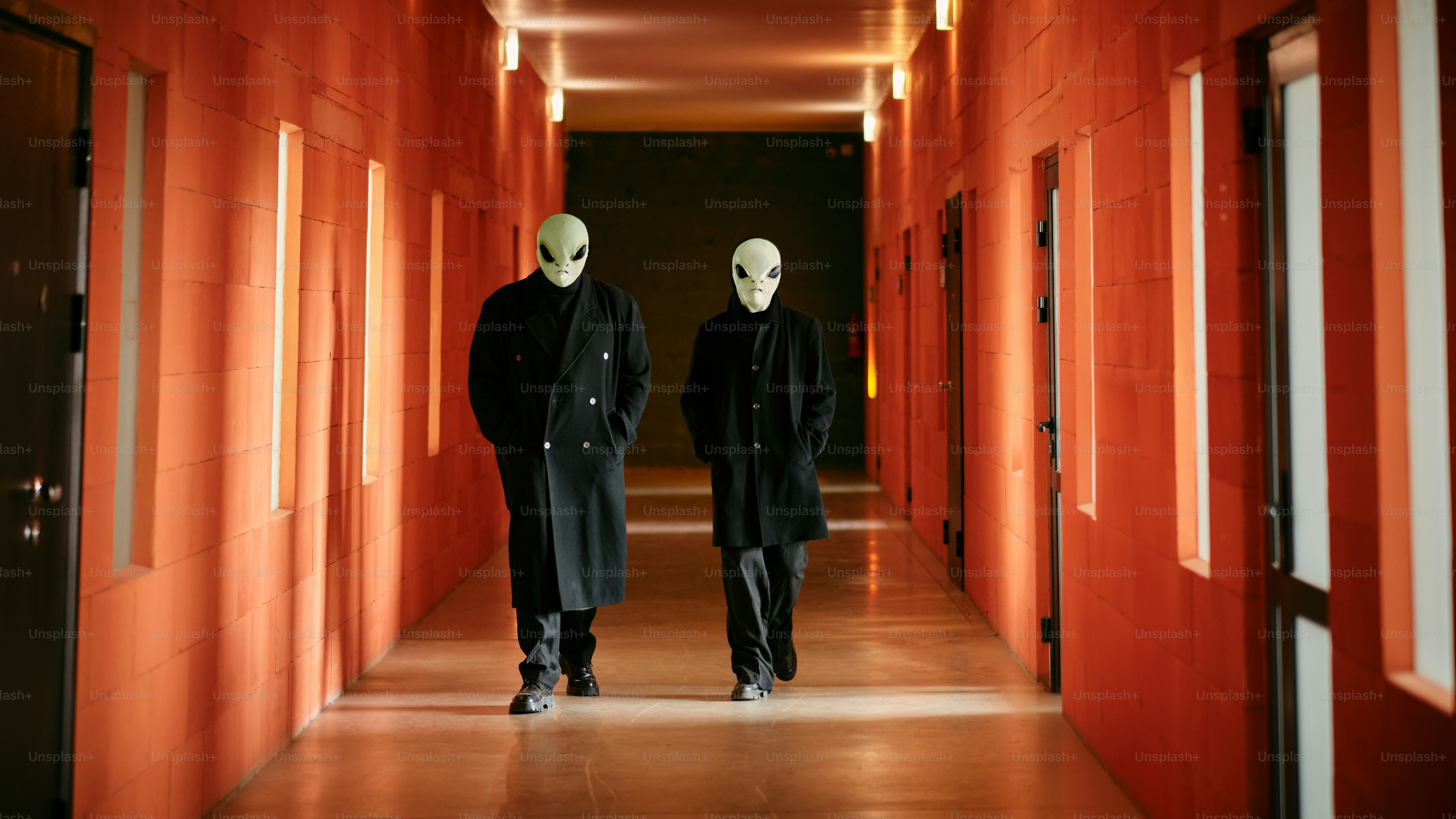 A couple of people that are walking down a hallway photo – Aliens Image ...