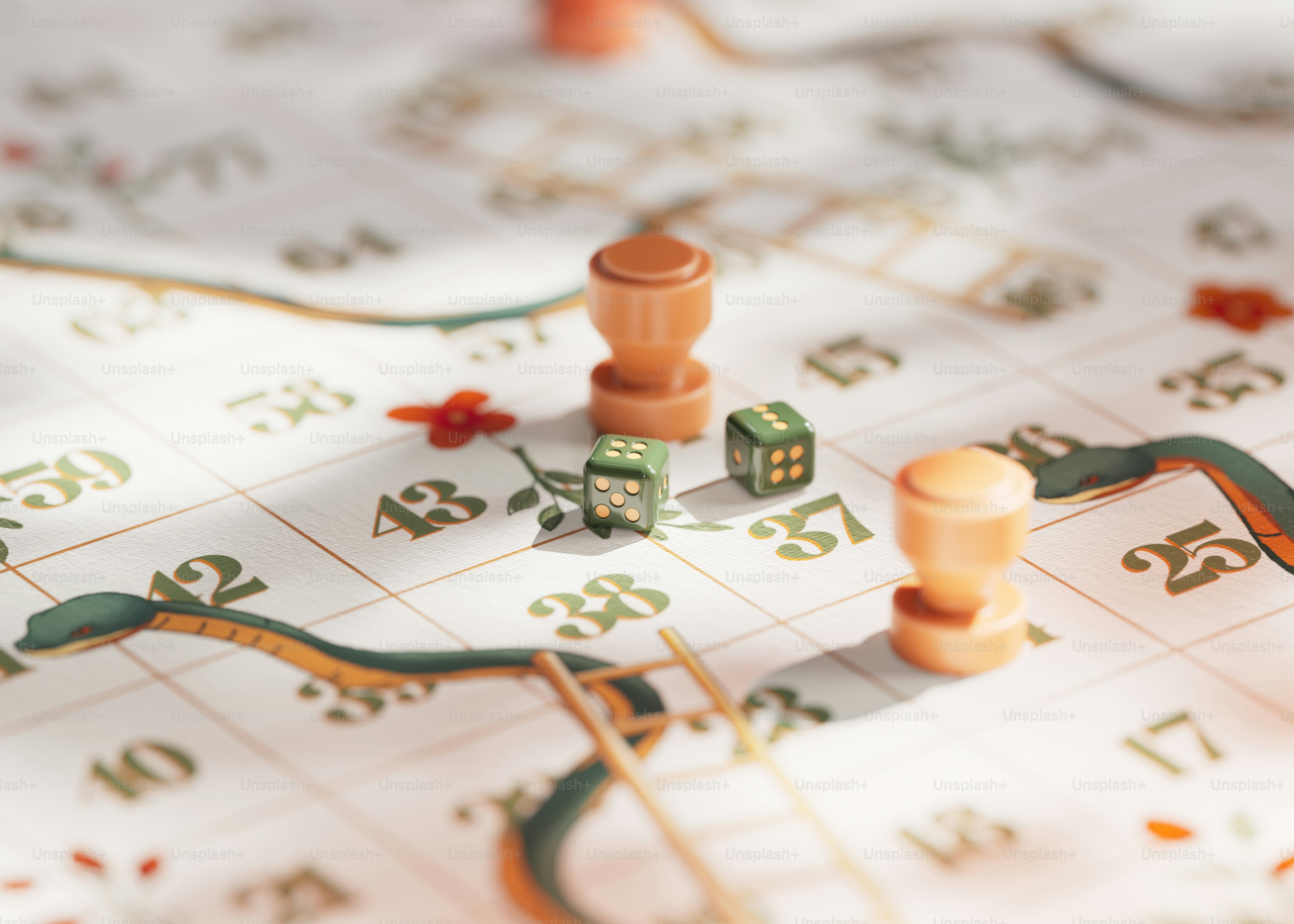 A close up of a board game with dices photo – Snakes and ladders Image on Unsplash