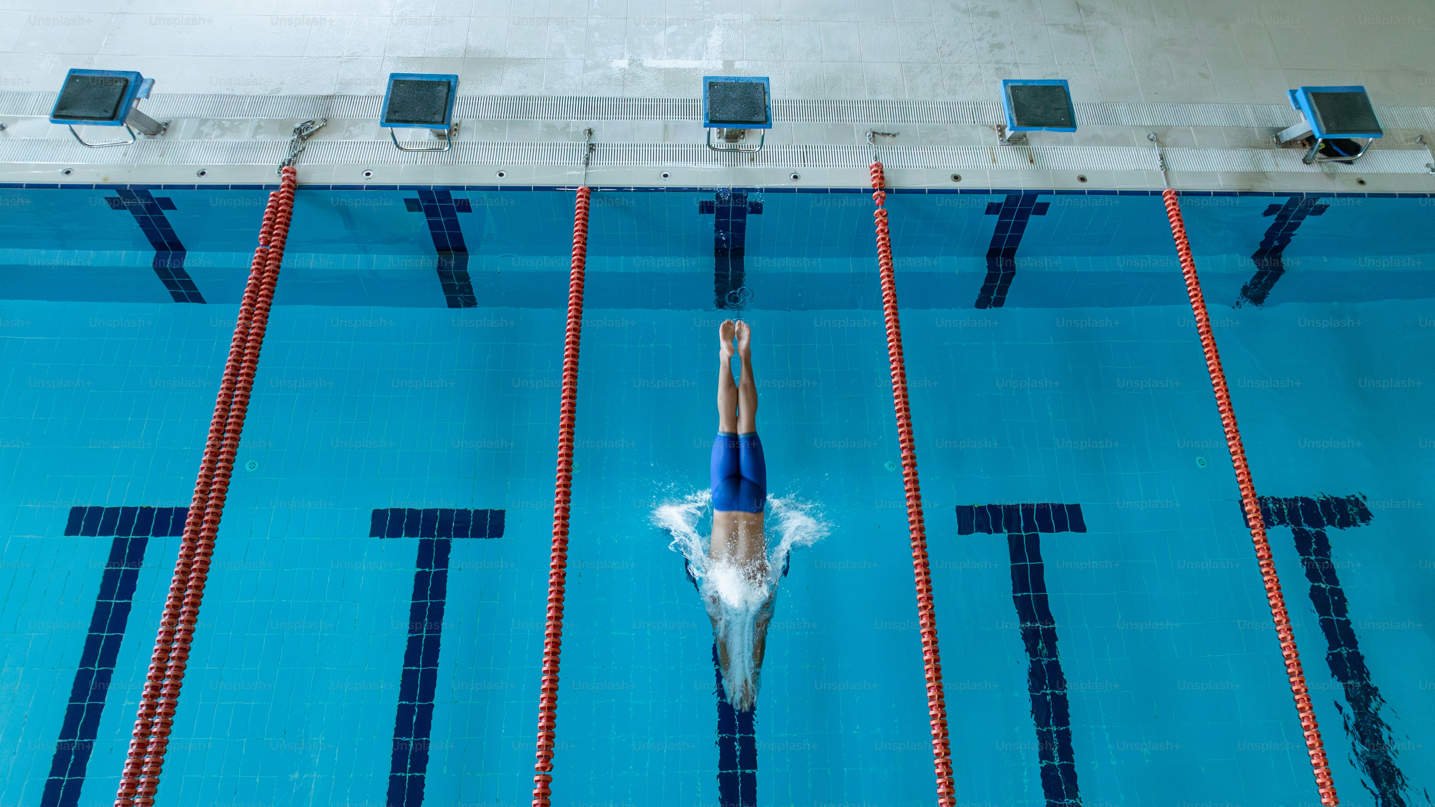 An overhead view of a swimming pool with lanes photo – Athlete Image on ...
